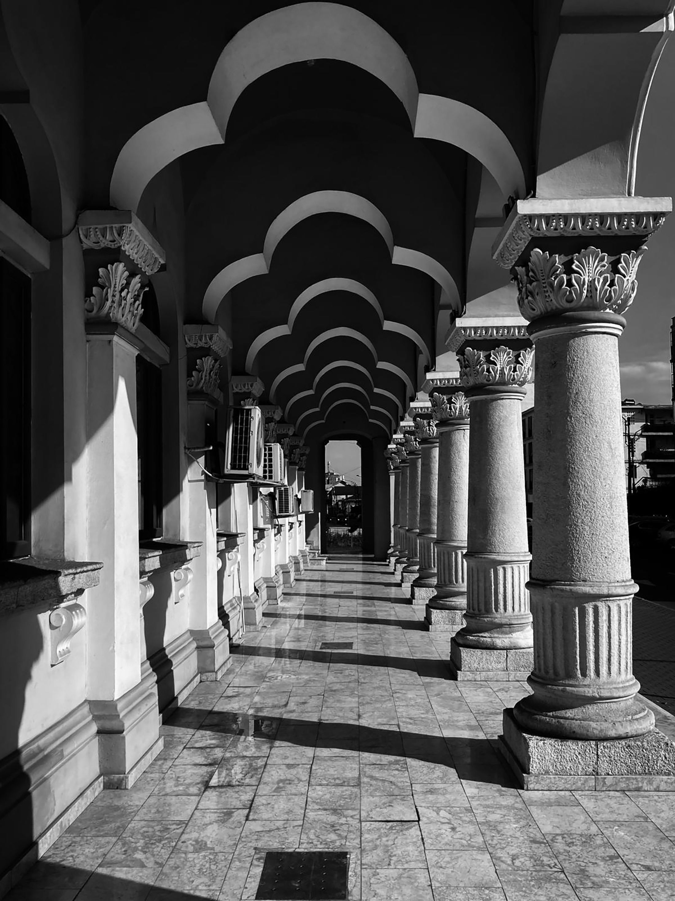 Grayscale Photo of Multi Arch Pathway · Free Stock Photo