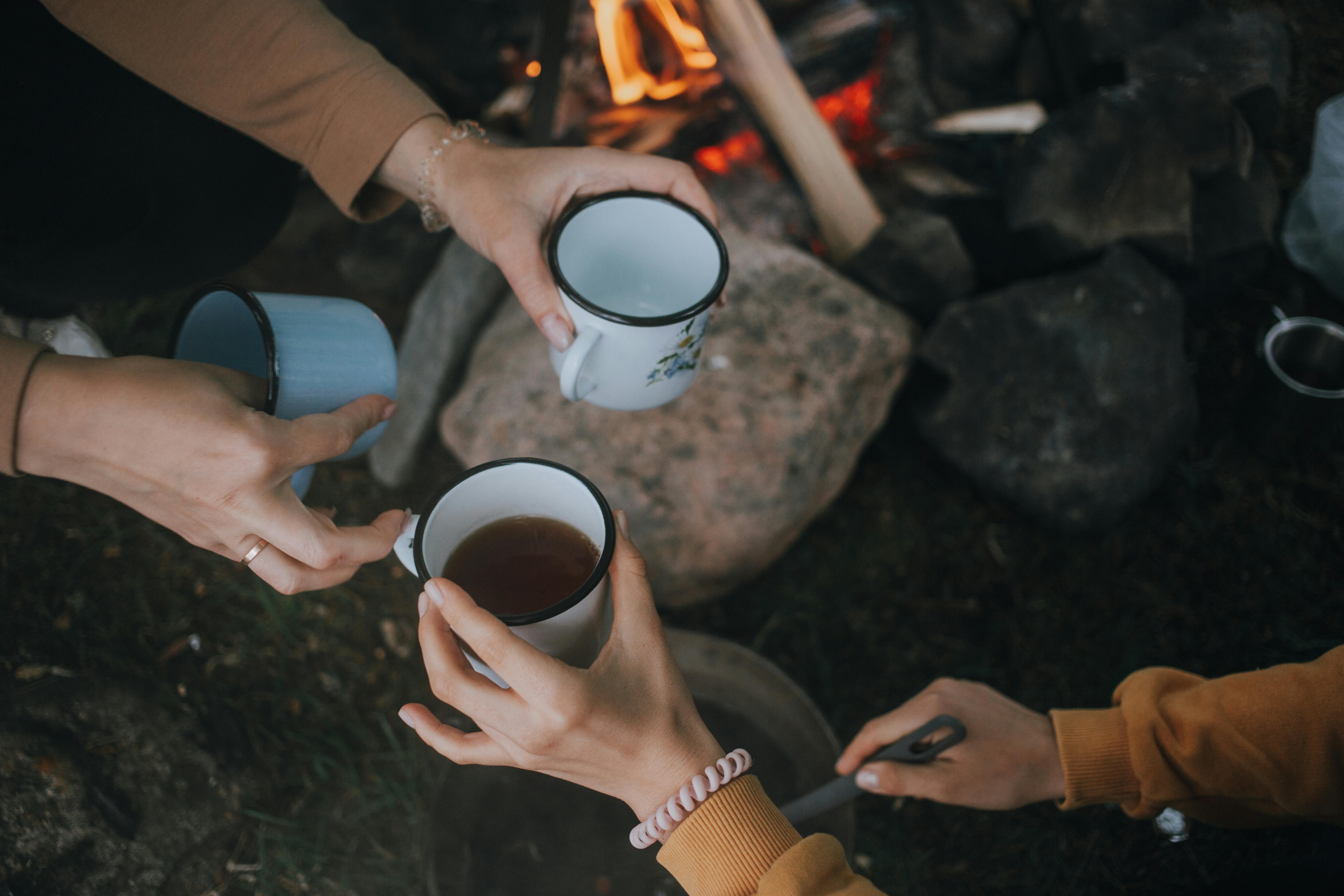 A Person Holding a Cup · Free Stock Photo