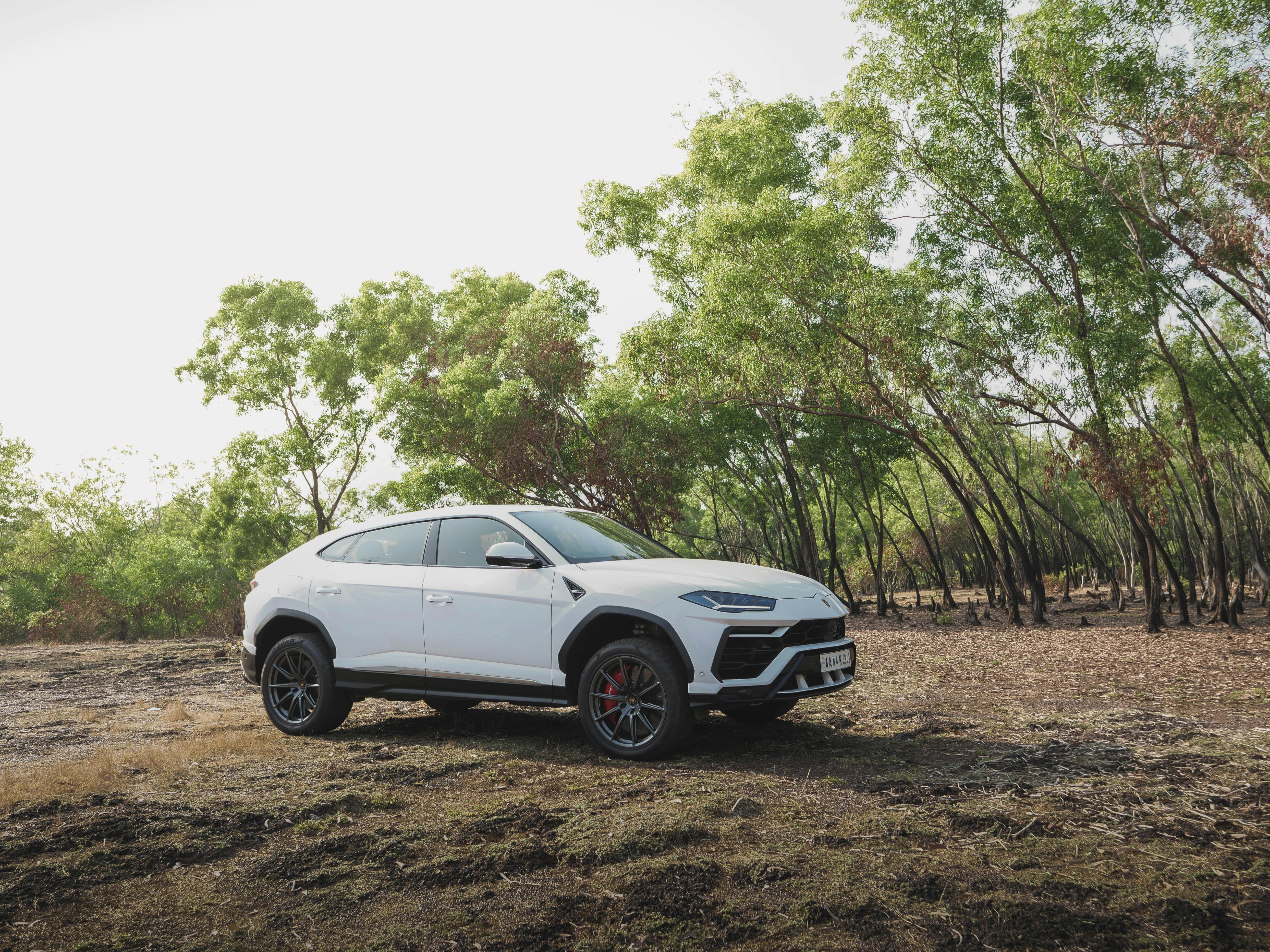 A Parked White Lamborghini Urus · Free Stock Photo