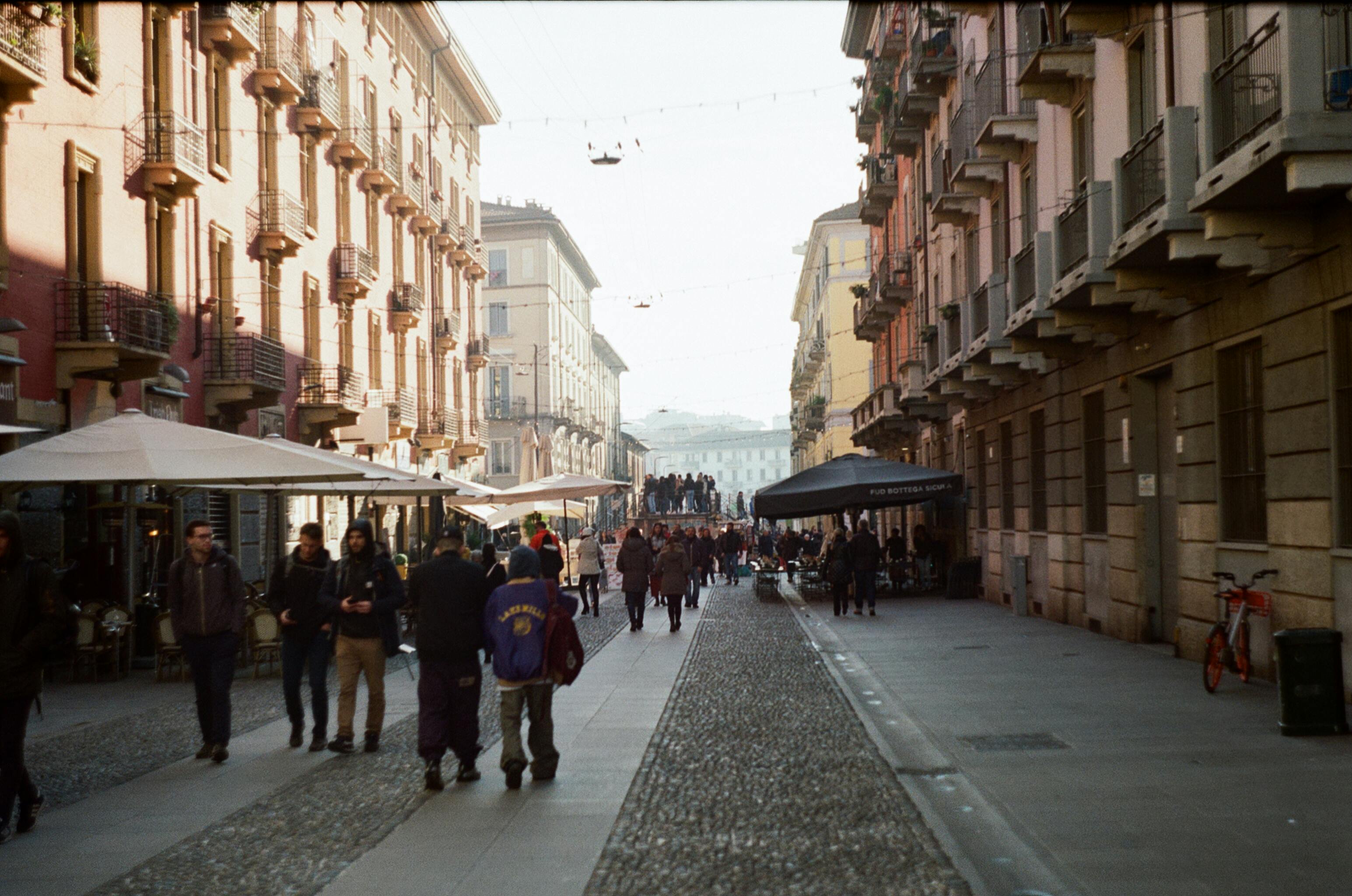 People Walking on Street Near Buildings · Free Stock Photo