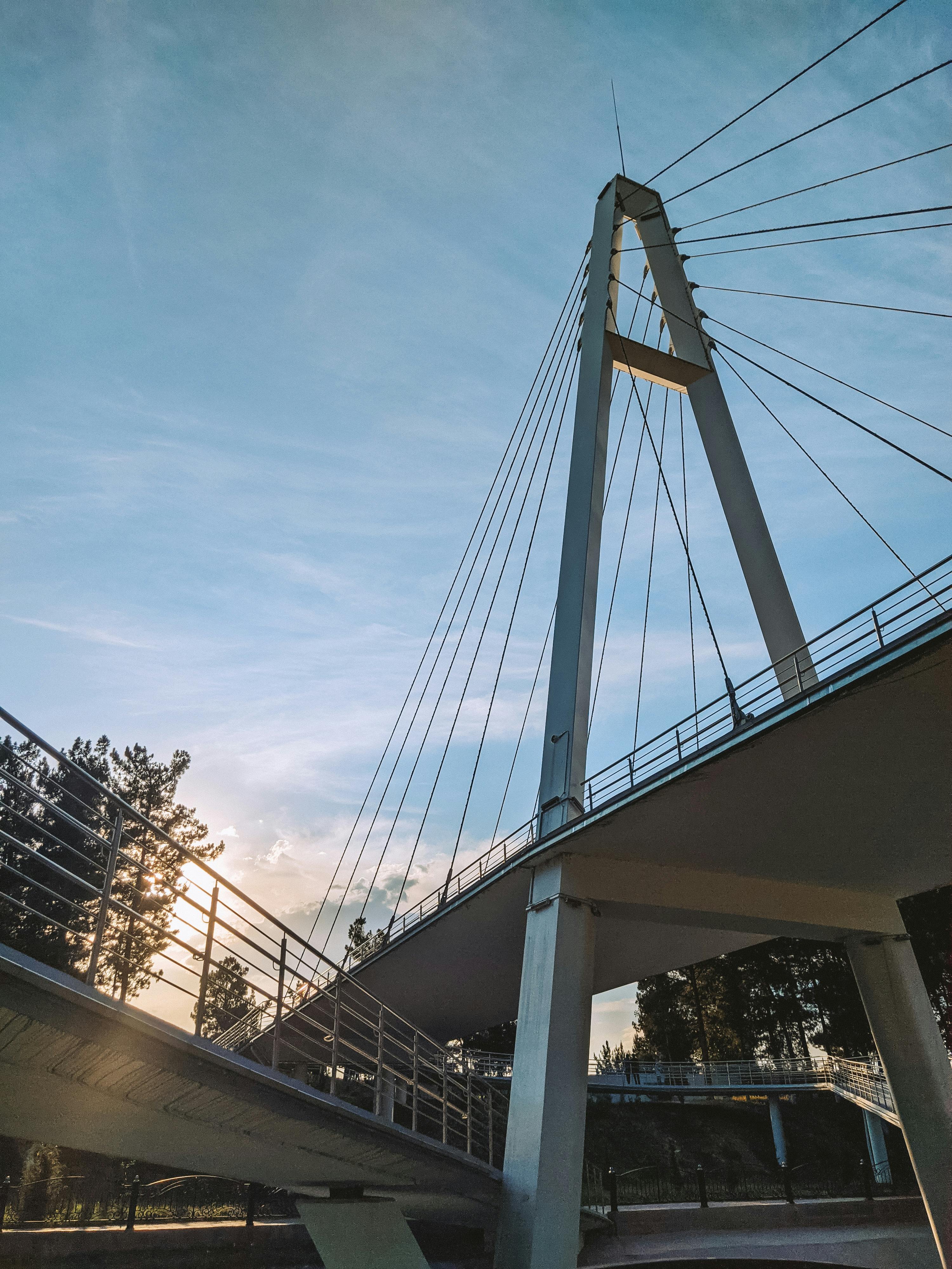 Modern Architectural Walkway with Lone Figure · Free Stock Photo