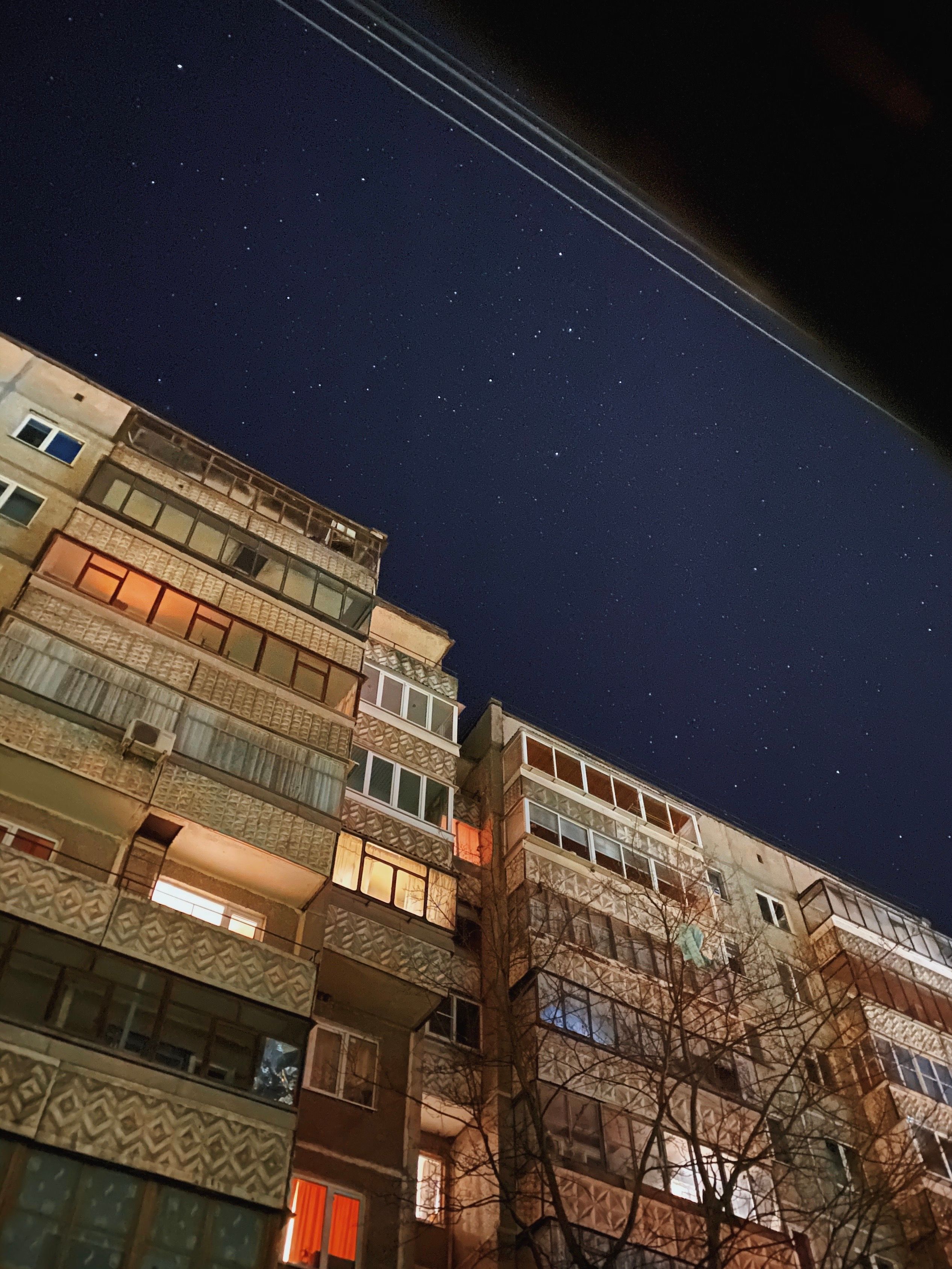 White Concrete Building during Night Time · Free Stock Photo
