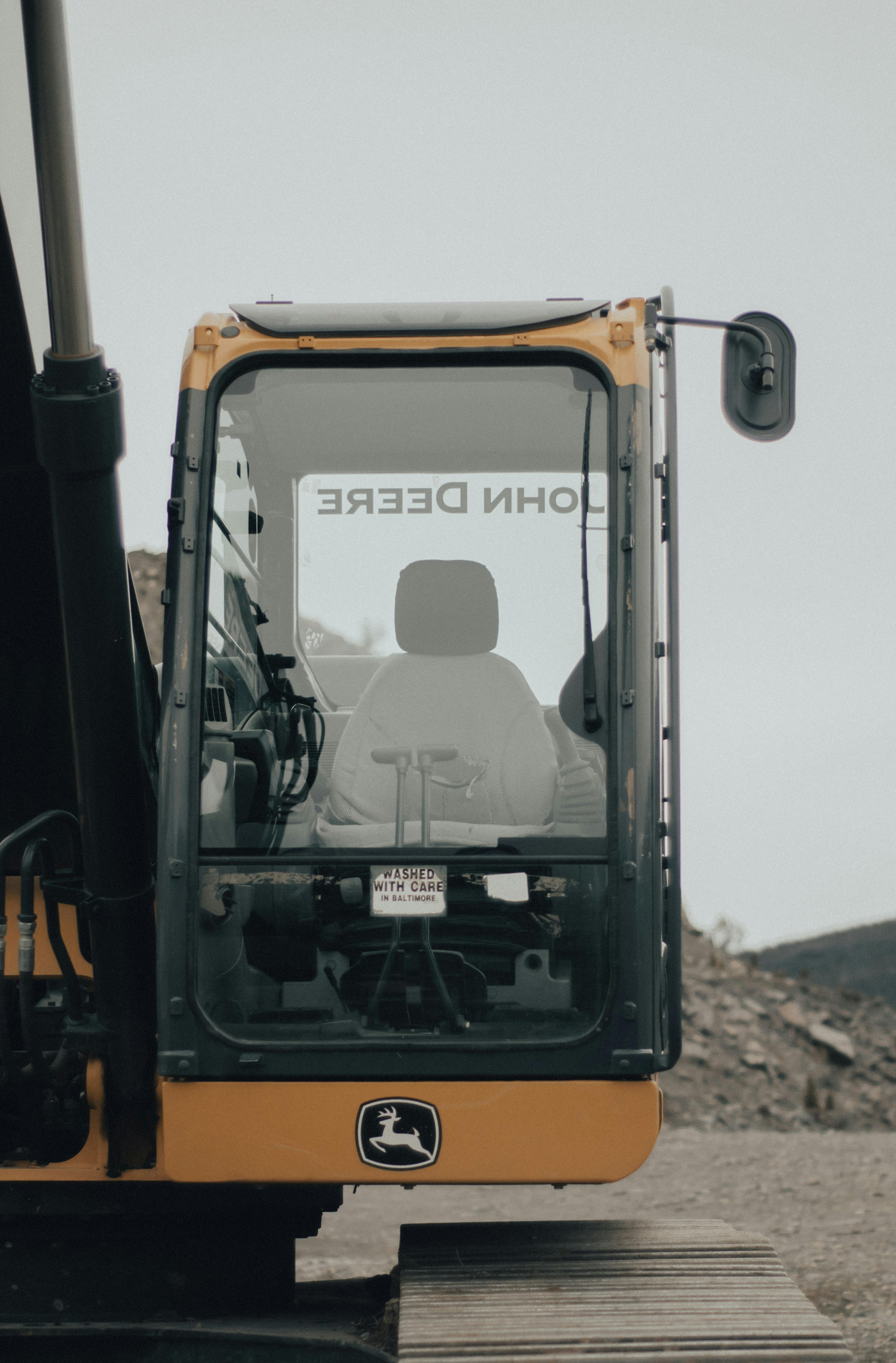 Men in High-Visibility Clothing on a Asphalt Paver · Free Stock Photo