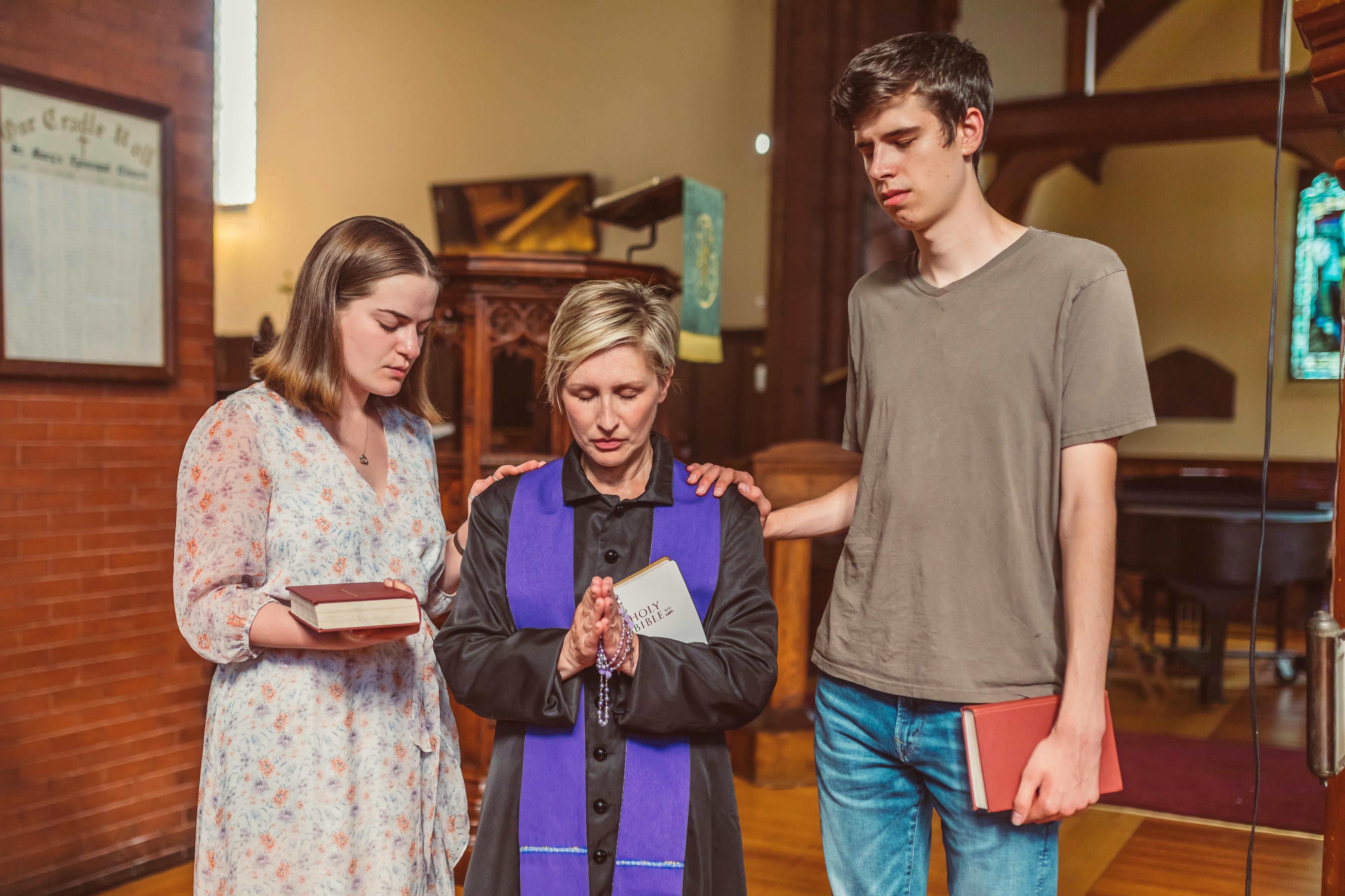 Female Pastor sitting beside a Crying Parishioner · Free Stock Photo