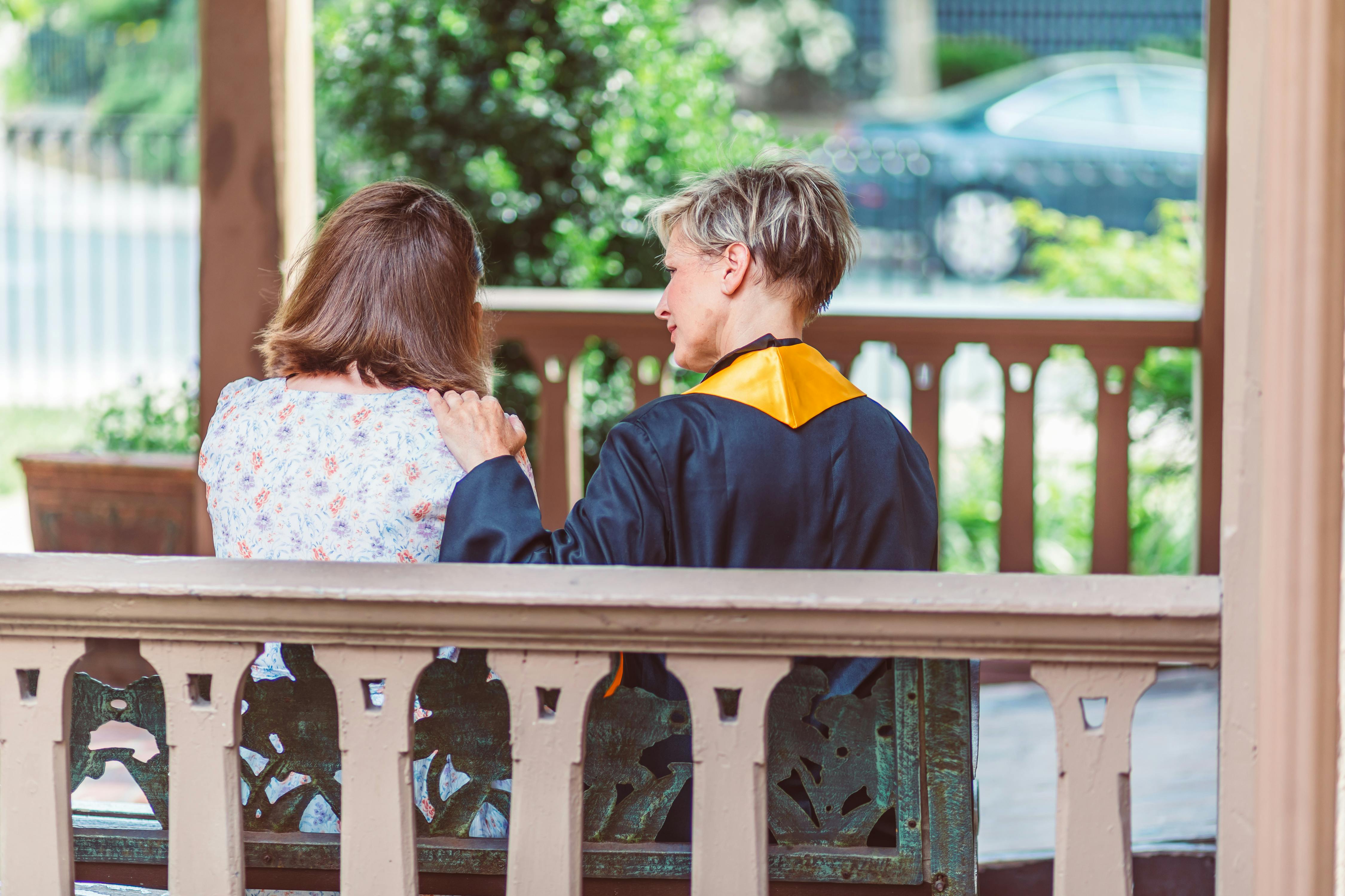 Female Pastor sitting beside a Crying Parishioner · Free Stock Photo