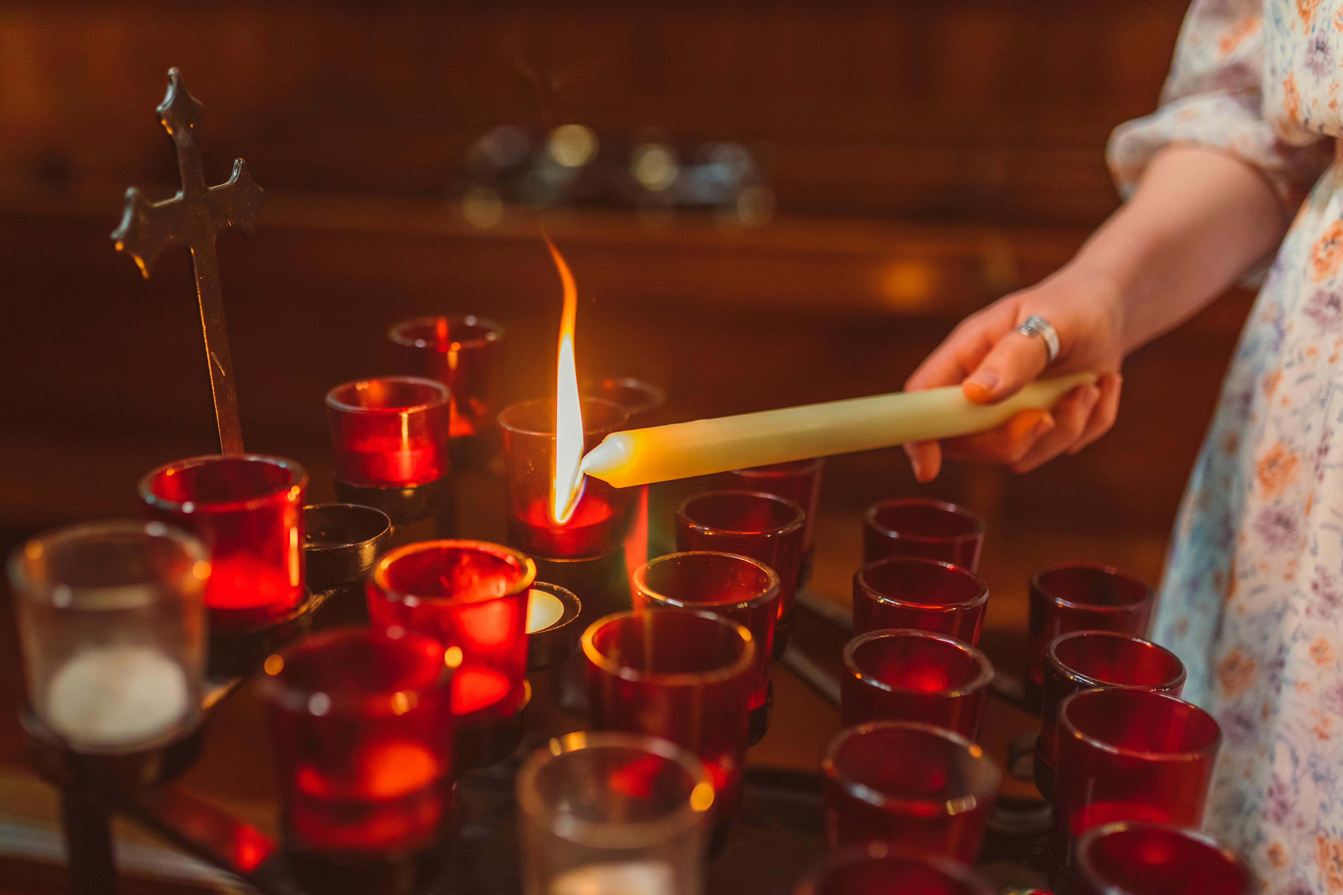 Holding a Lighted Candle · Free Stock Photo