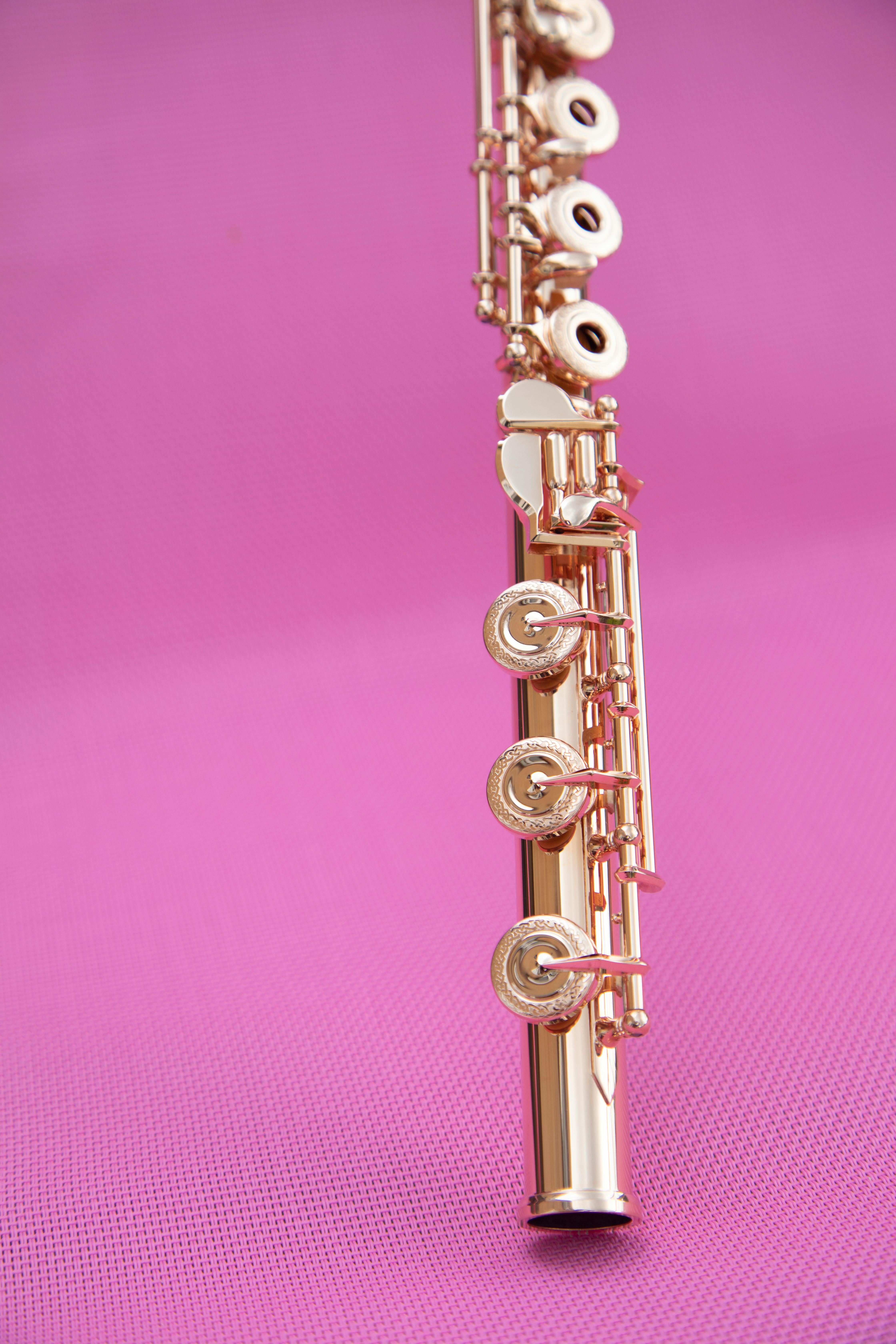 A Flute on a Pink Surface · Free Stock Photo
