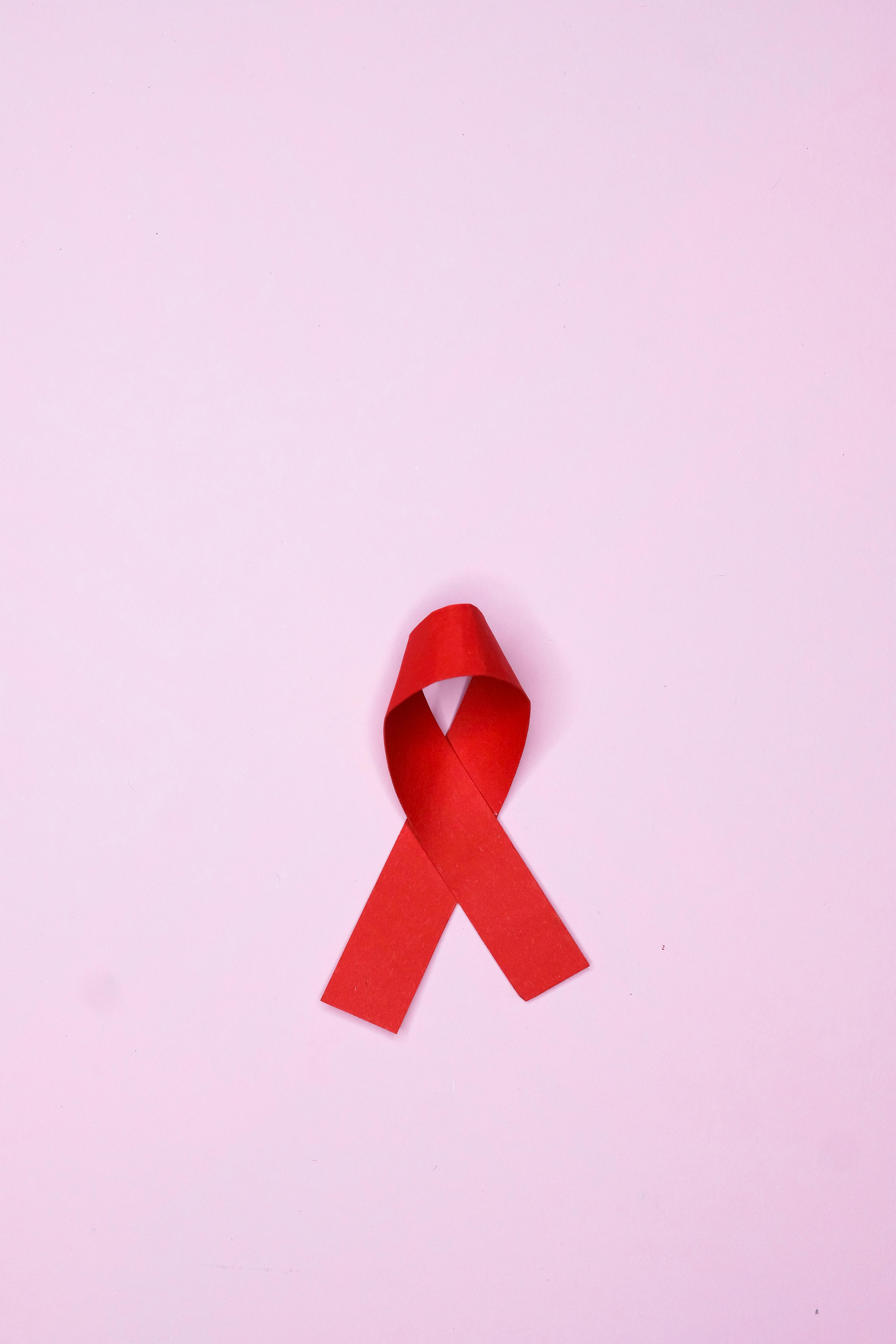 Man Wearing Red Ribbon · Free Stock Photo