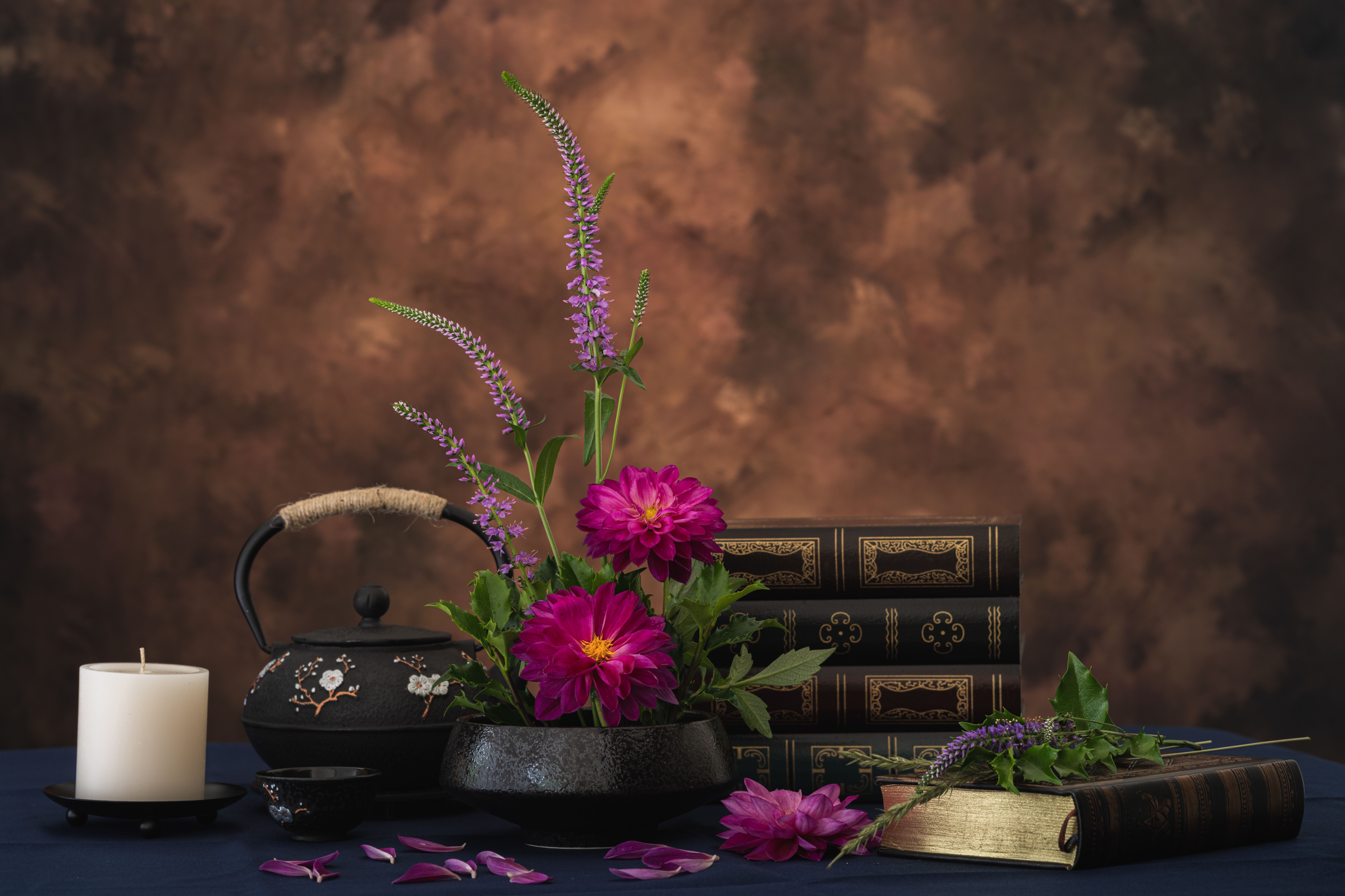 Flowers and Books on a Table · Free Stock Photo