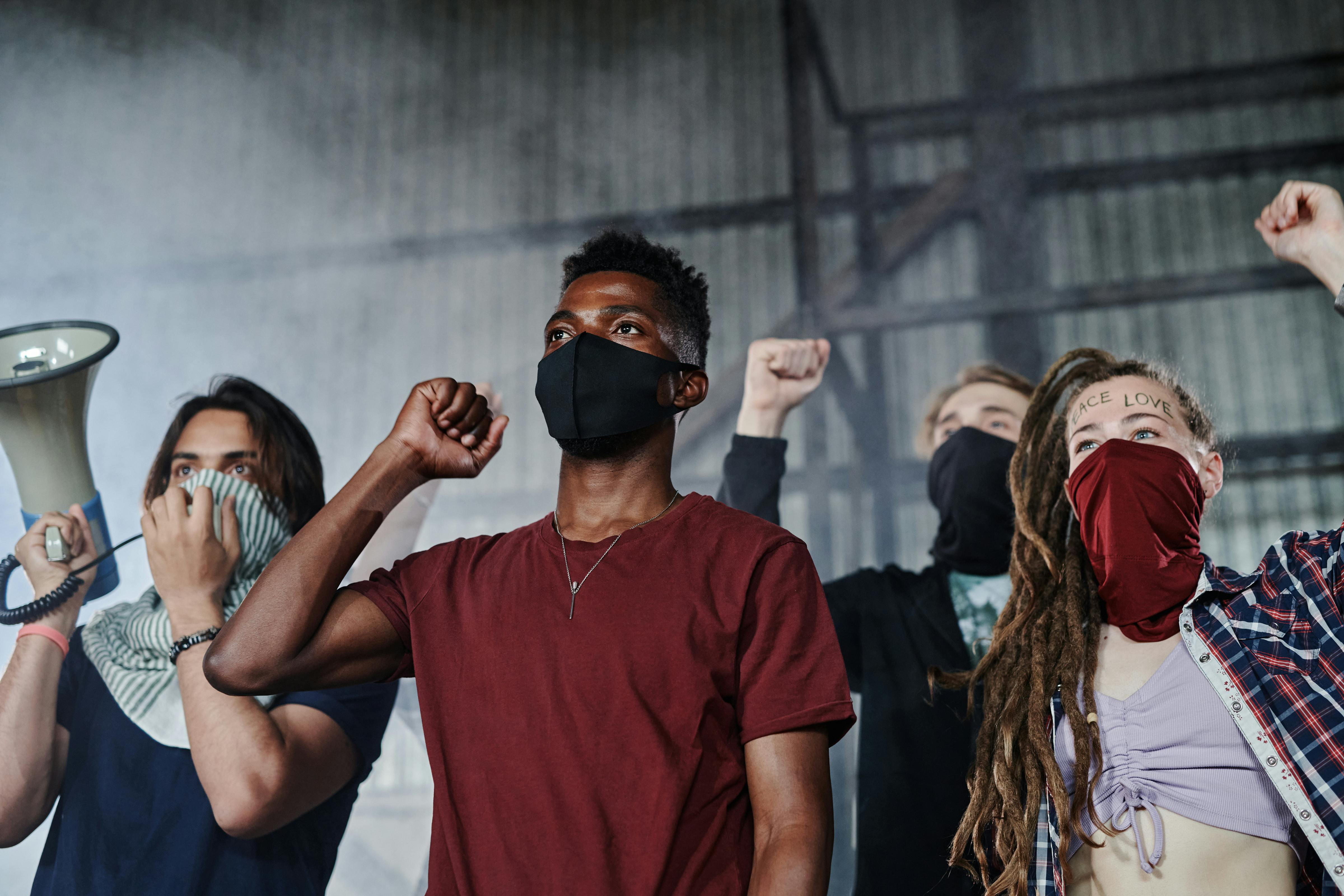 Group of People Wearing Face Mask while Protesting · Free Stock Photo