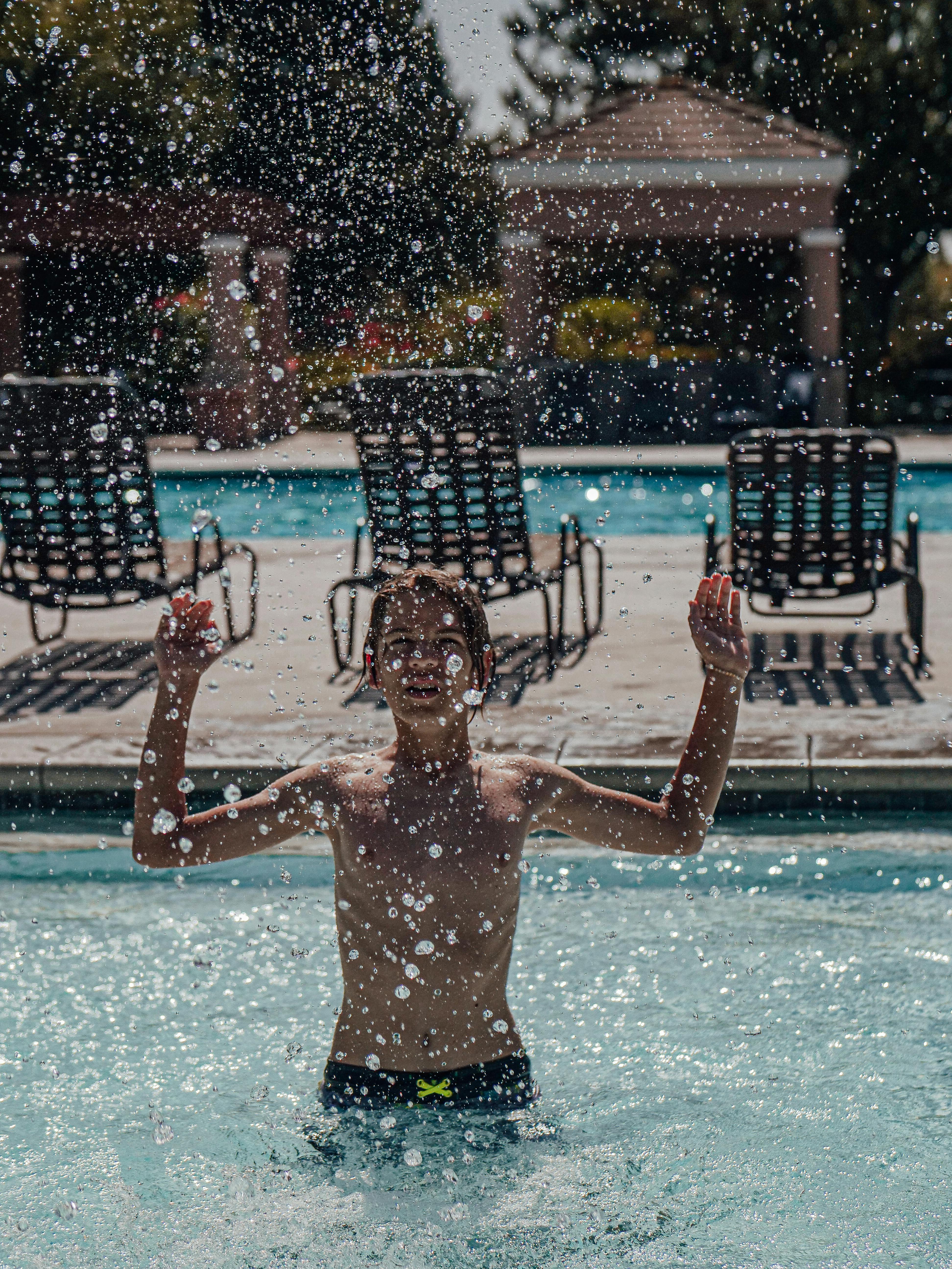 A Man Standing in the Pool · Free Stock Photo