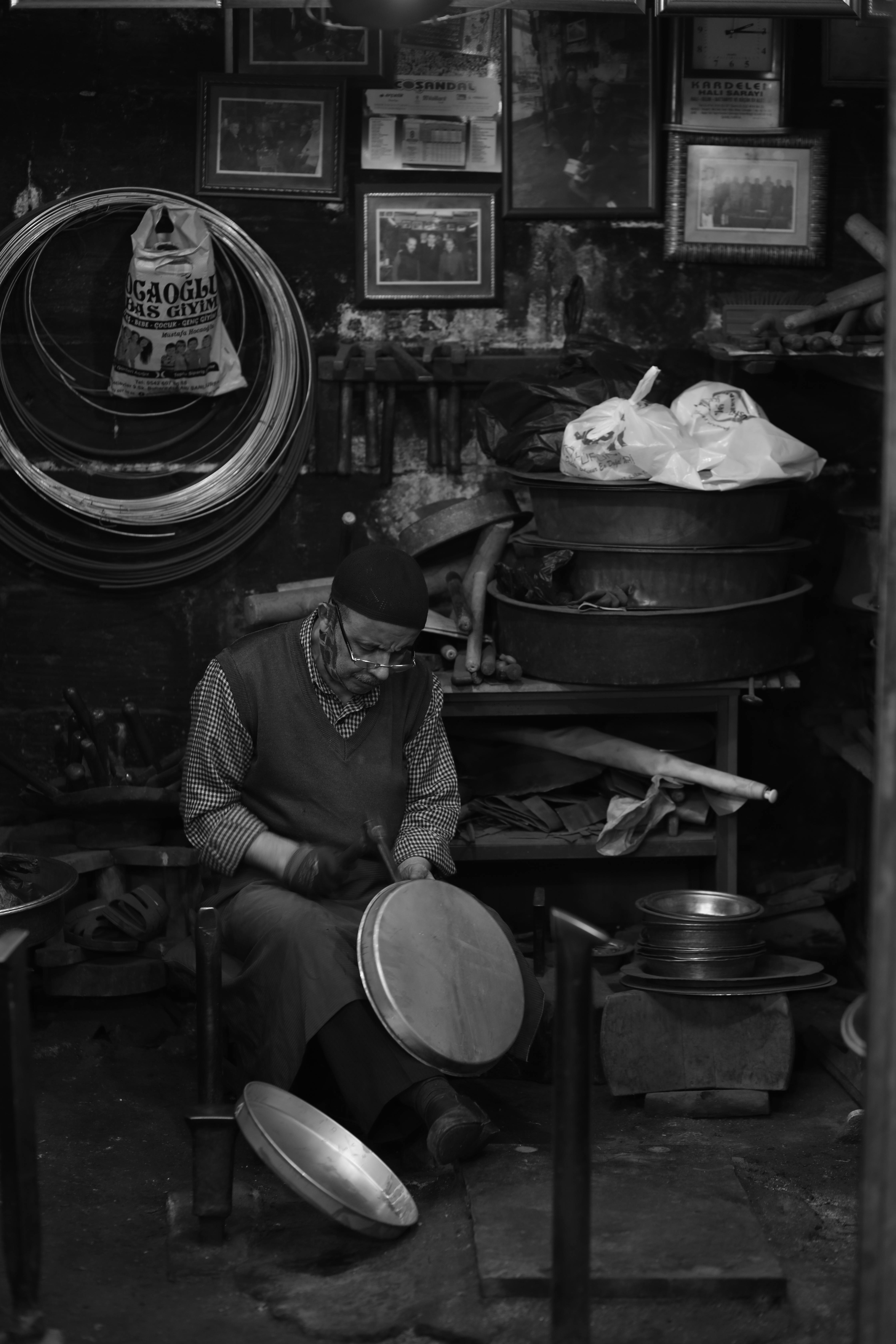 A Shoemaker at Work · Free Stock Photo