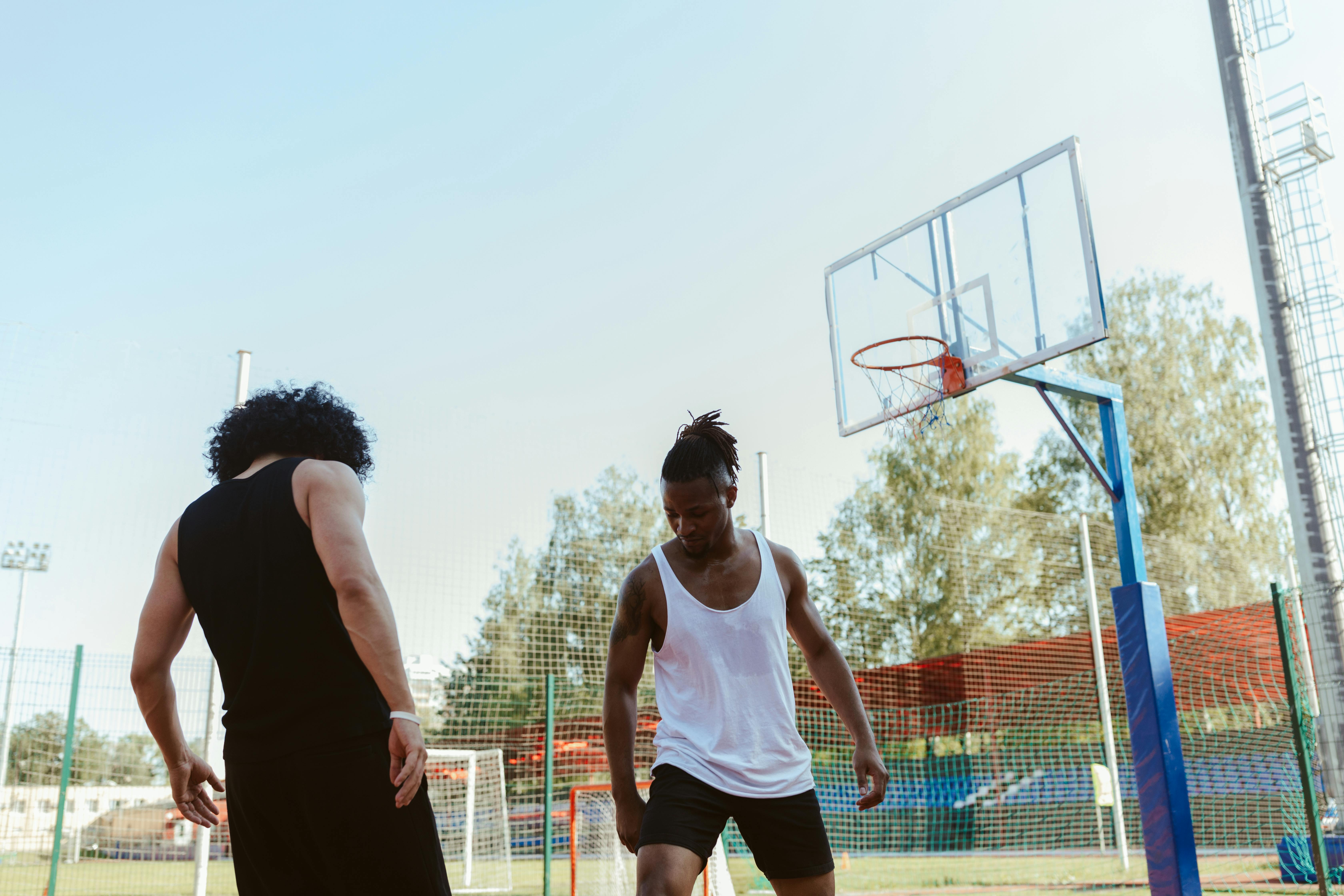 Two Men Playing Basketball · Free Stock Photo