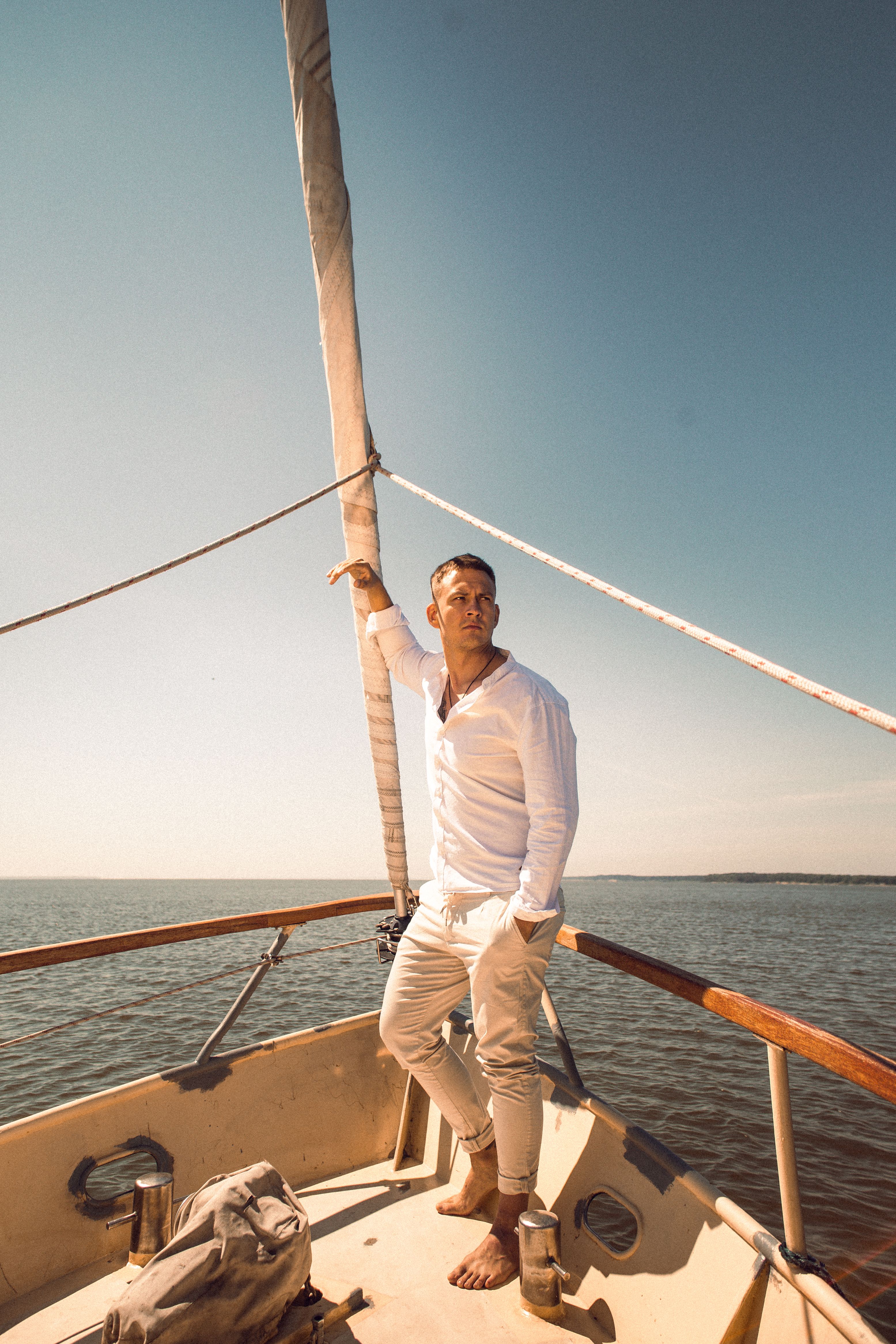 A Man Standing on a Boat · Free Stock Photo