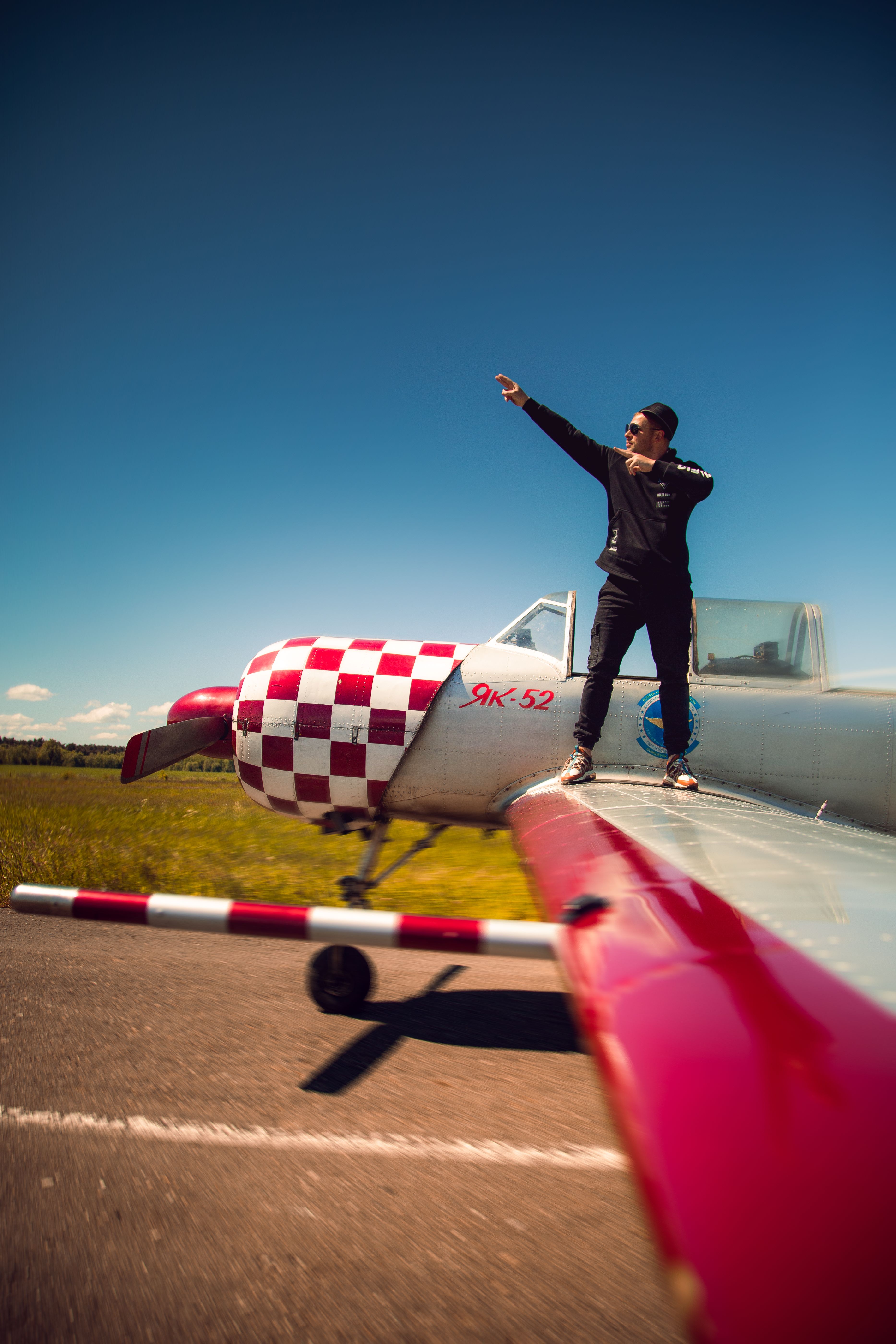 A Man Posing with a Jet · Free Stock Photo