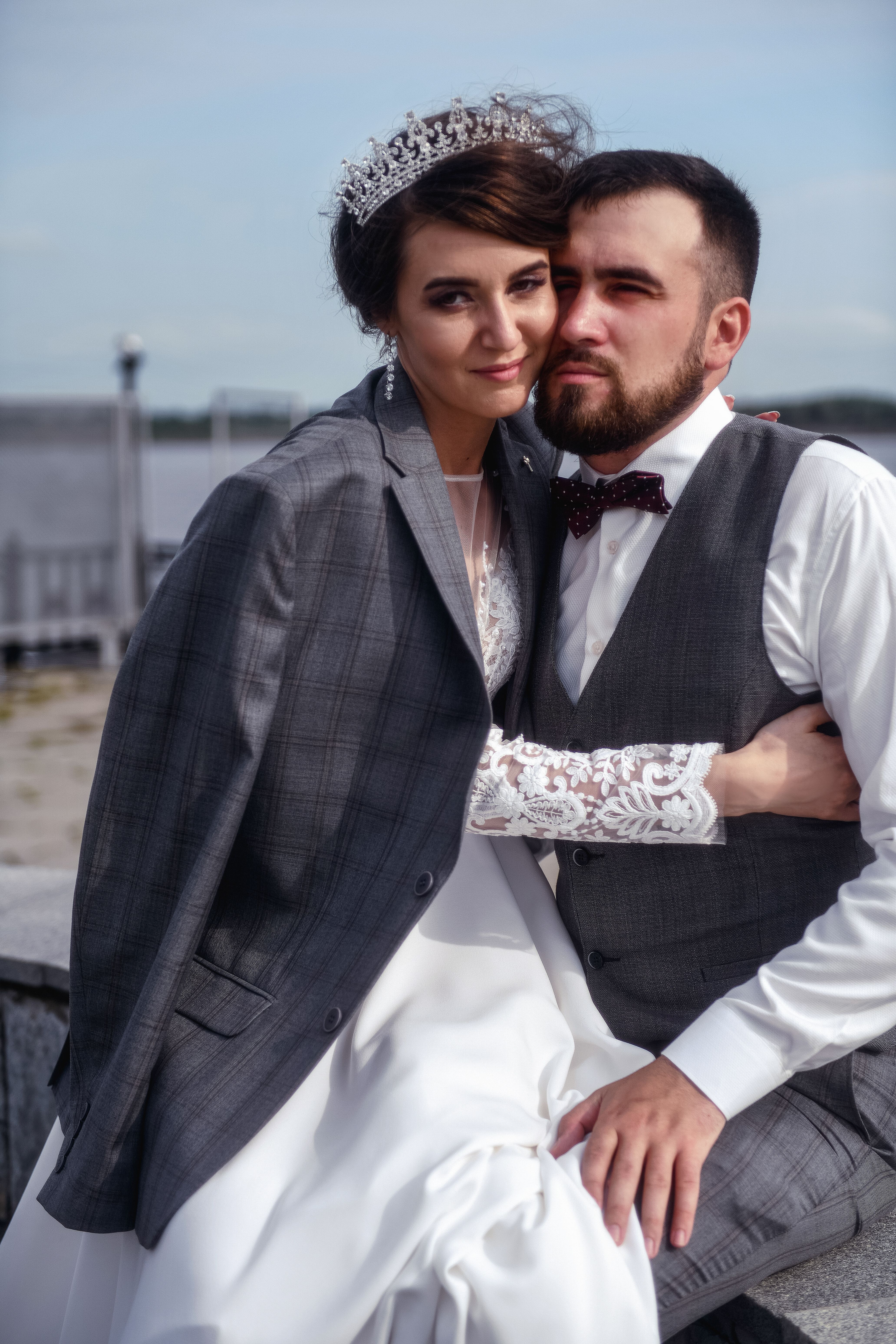 Crop young newlyweds bonding in light wedding studio · Free Stock Photo