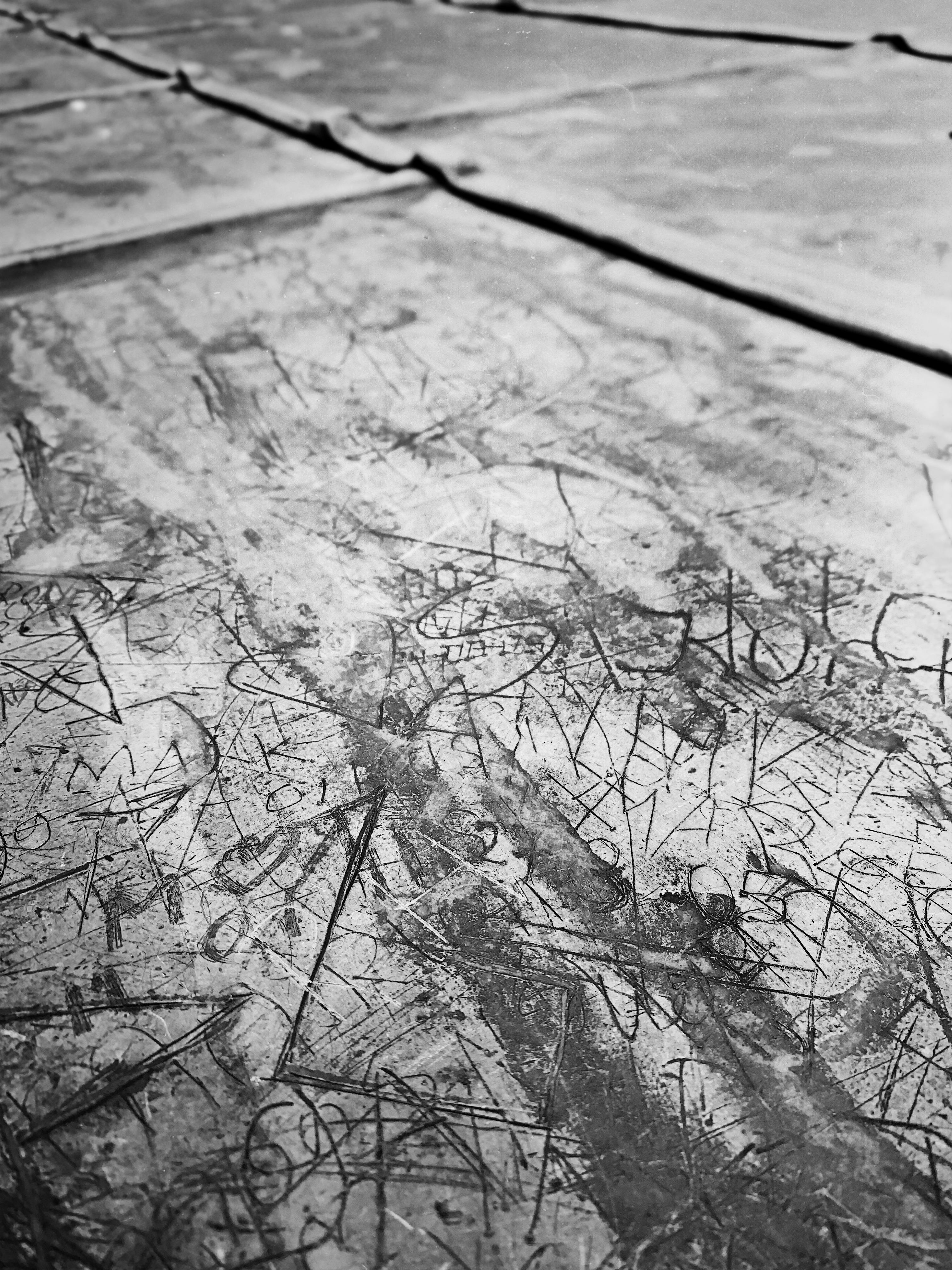 Scratched Text on Surface · Free Stock Photo