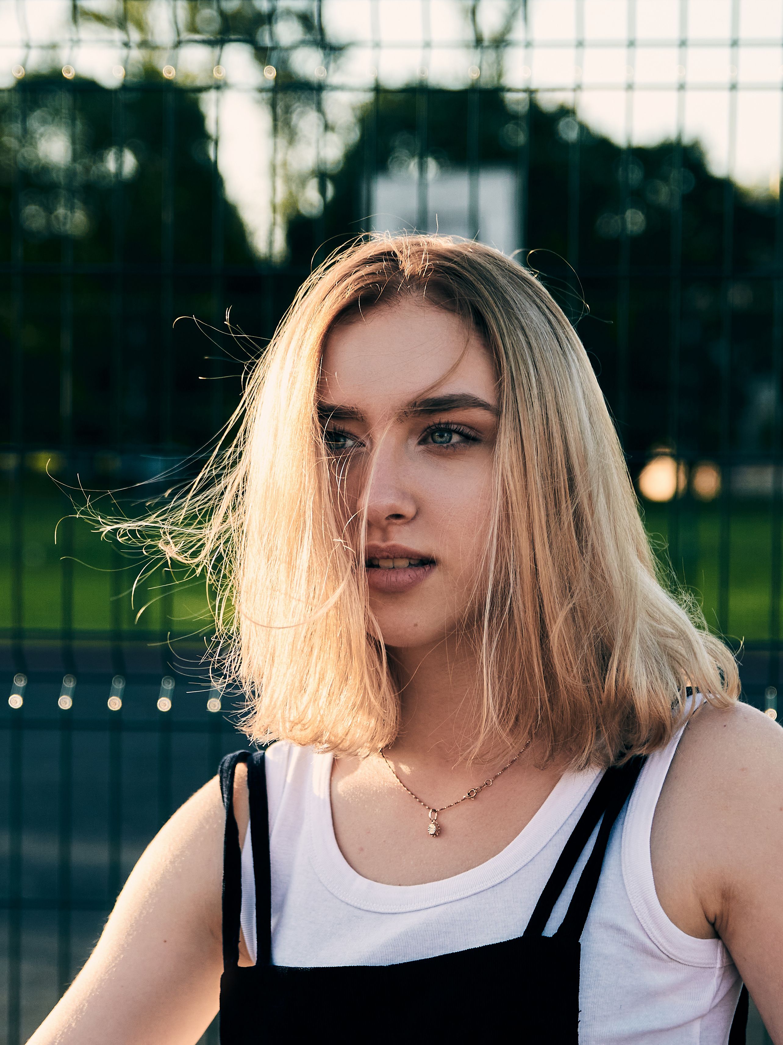 Beautiful Woman Wearing White Tank Top · Free Stock Photo