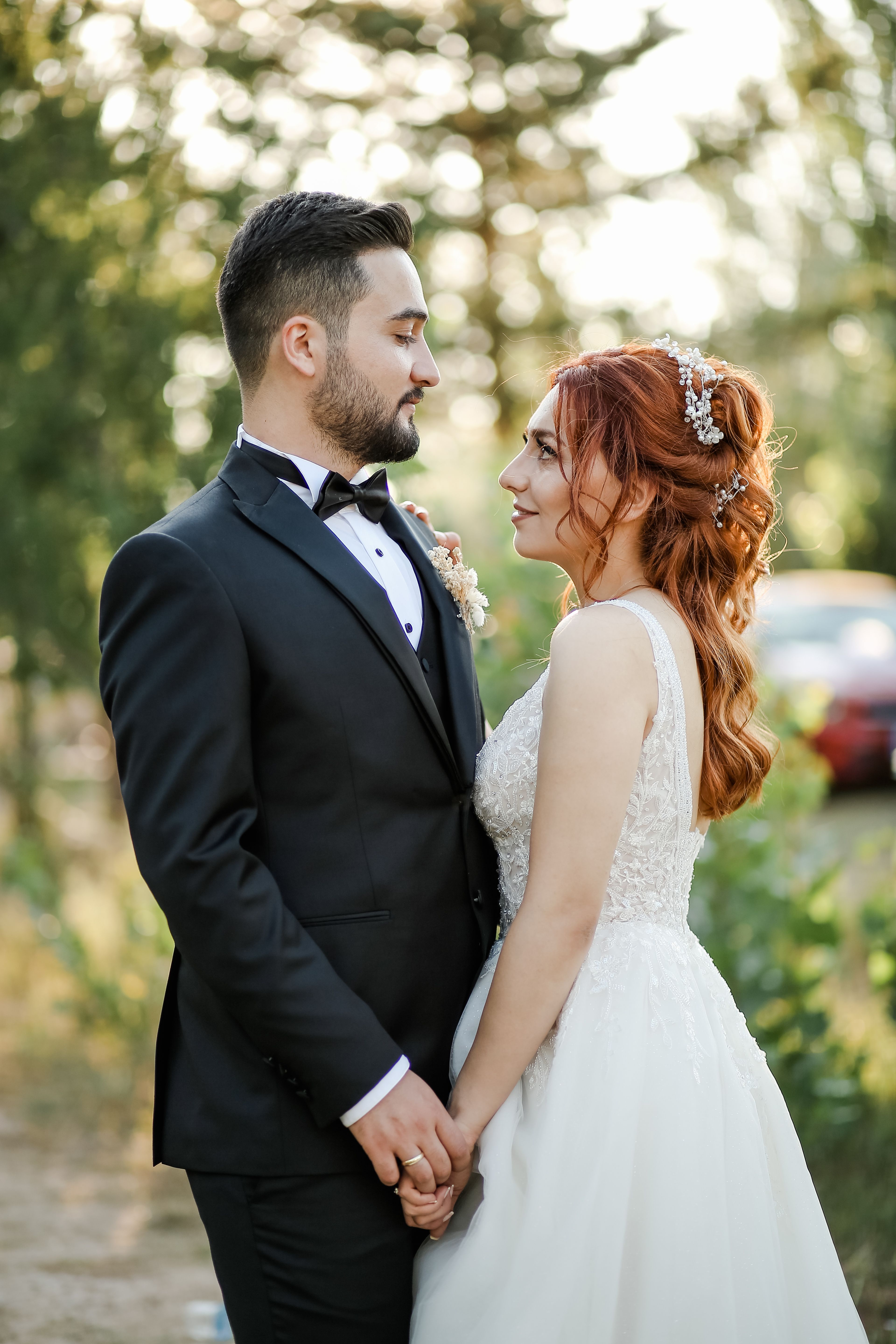 The Groom Lovingly Looking at his Bride · Free Stock Photo