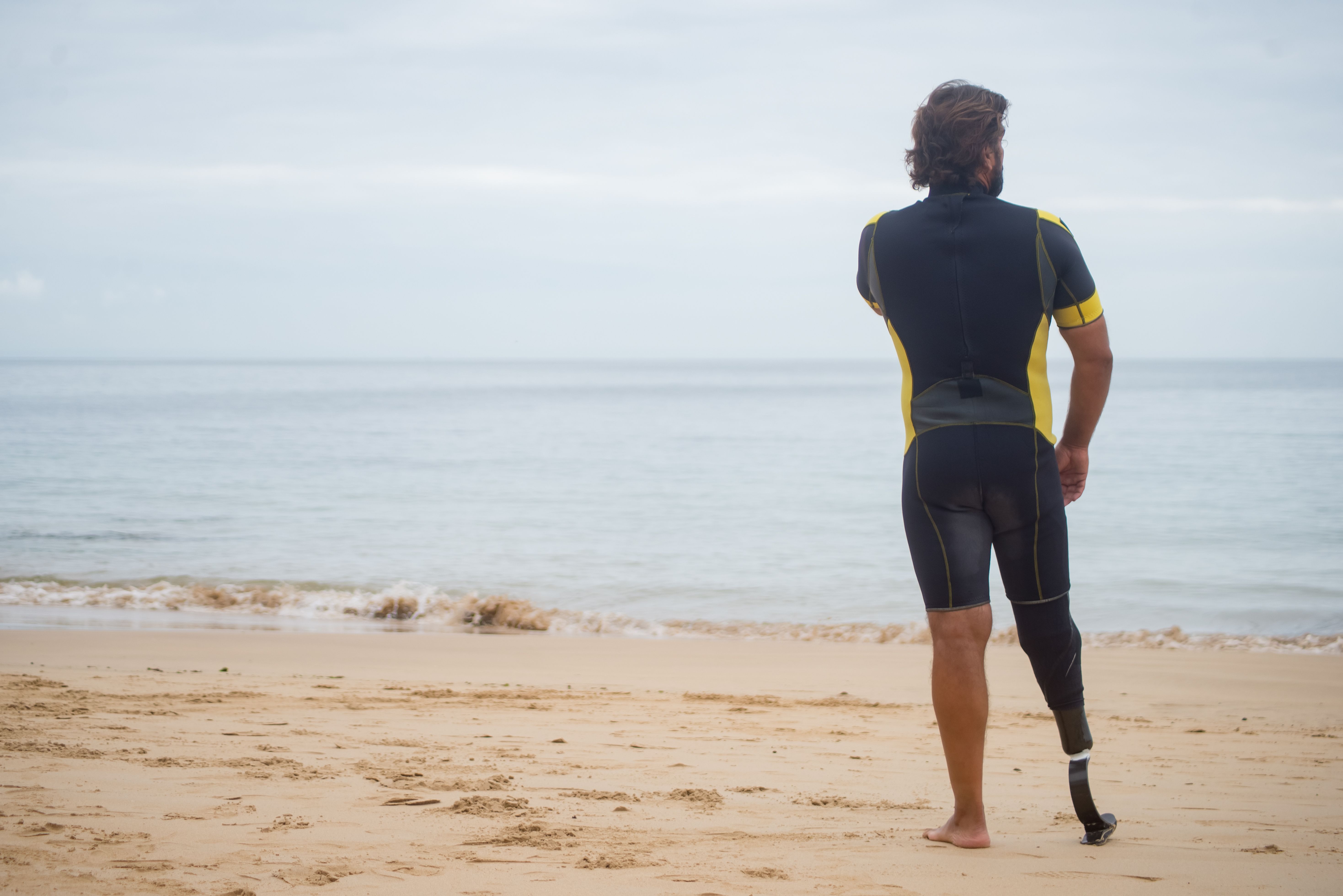 A Man Fixing His Prosthetic Leg · Free Stock Photo