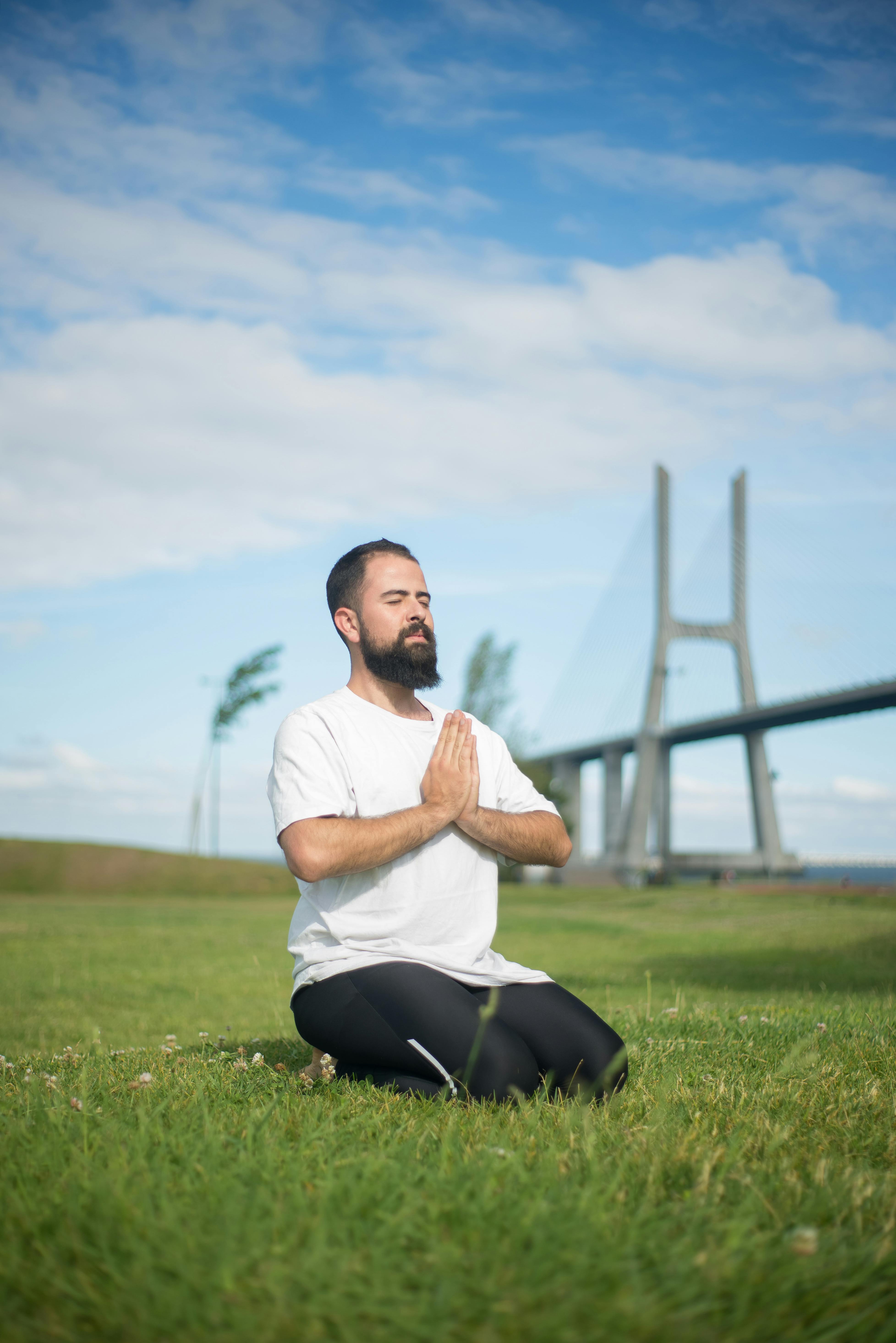 Man in Black Shirt Doing Yoga · Free Stock Photo