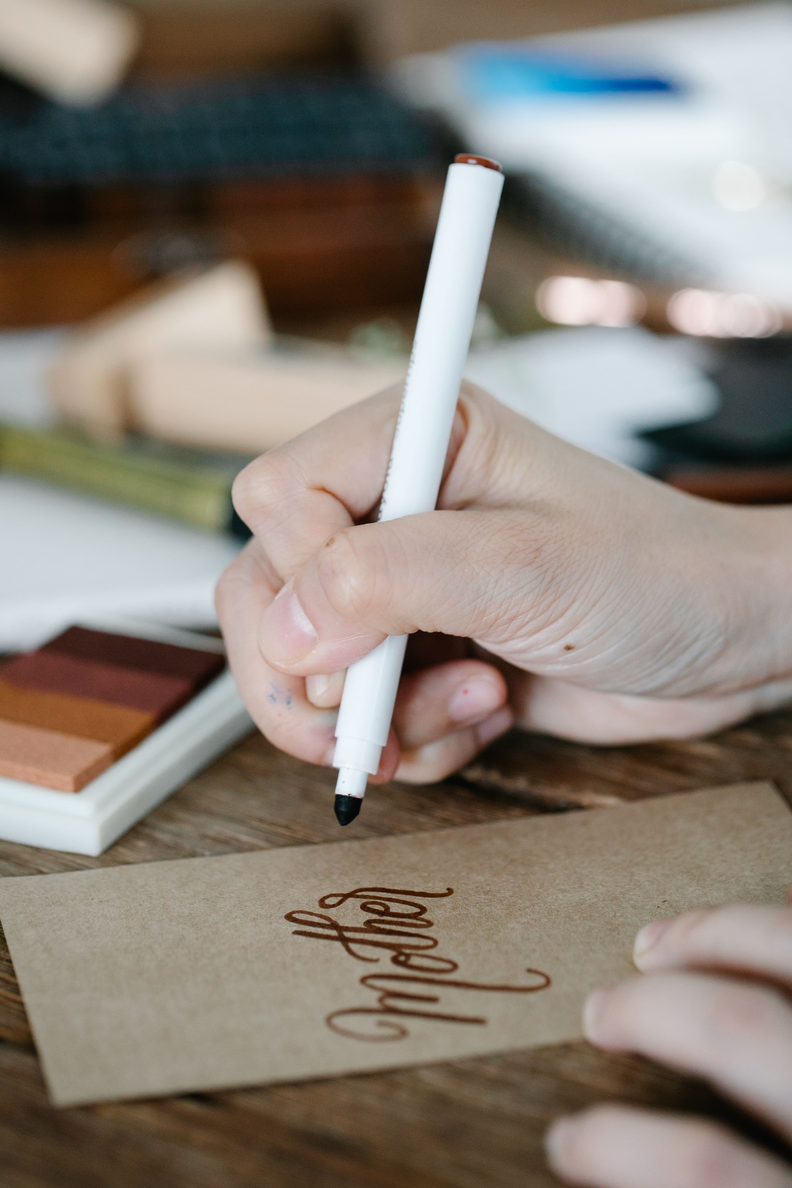 Creative concept of calligraphy letter writing as hobby · Free Stock Photo