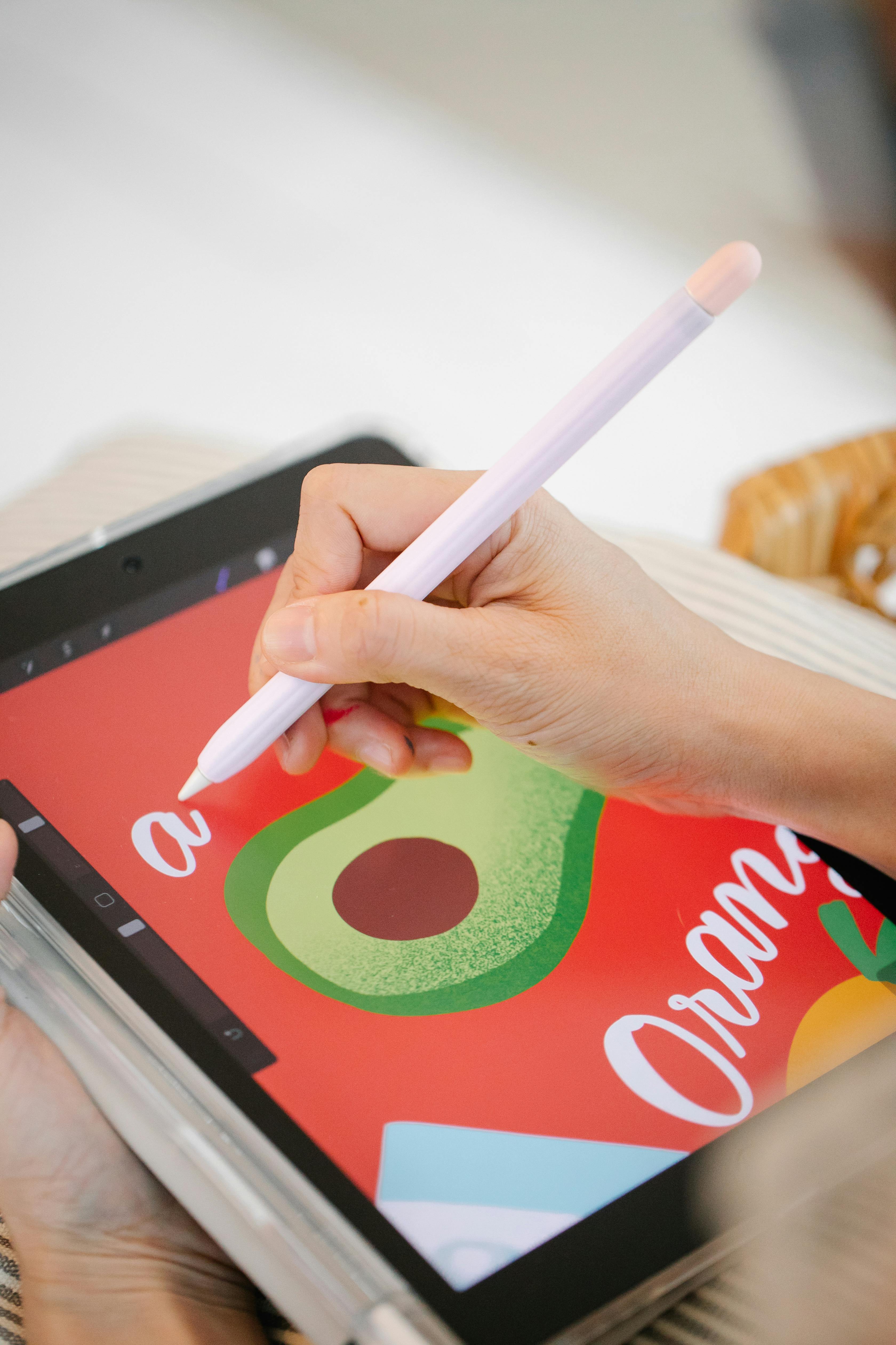 Writing on Tablet Screen · Free Stock Photo