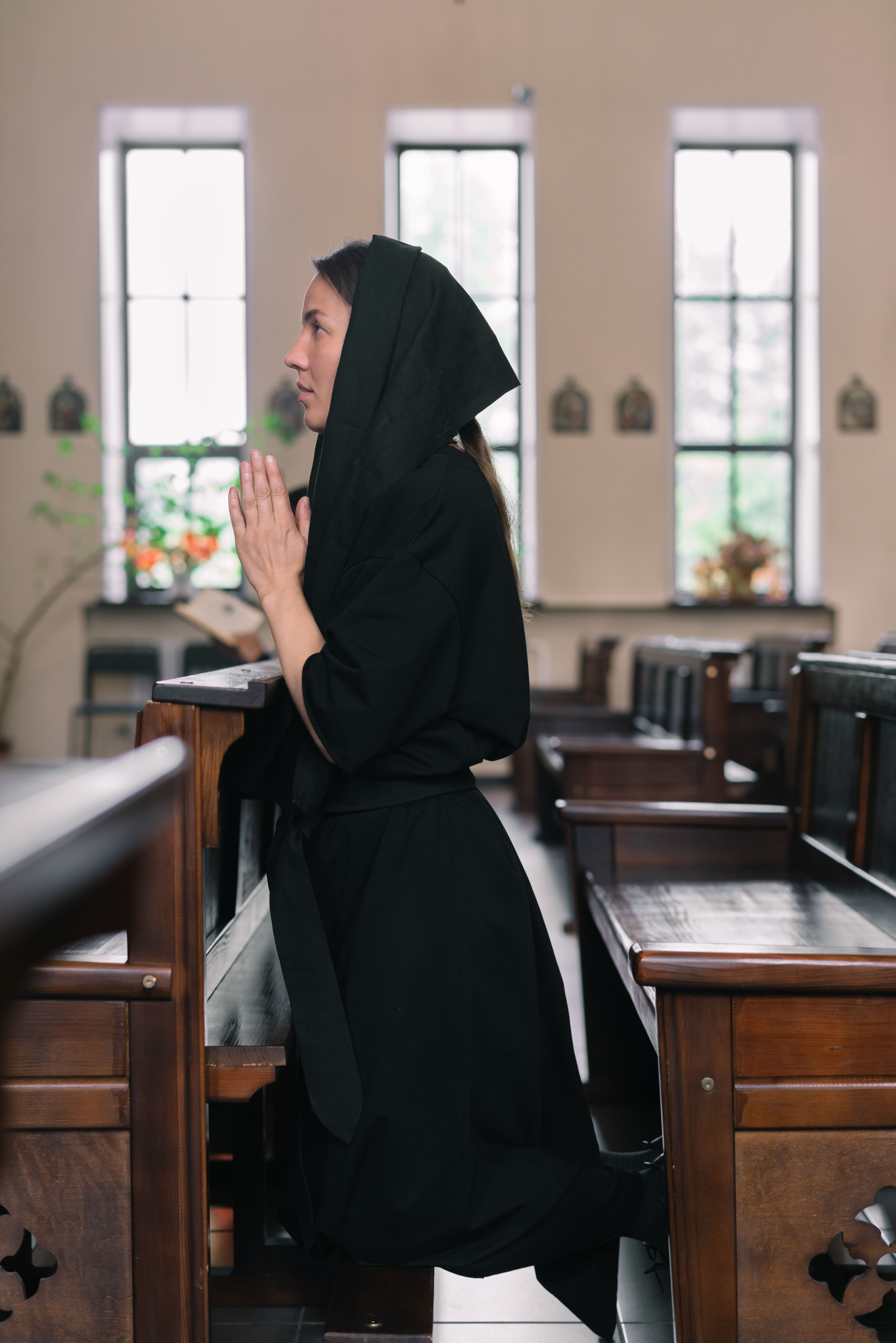 Woman Praying Inside the Church · Free Stock Photo