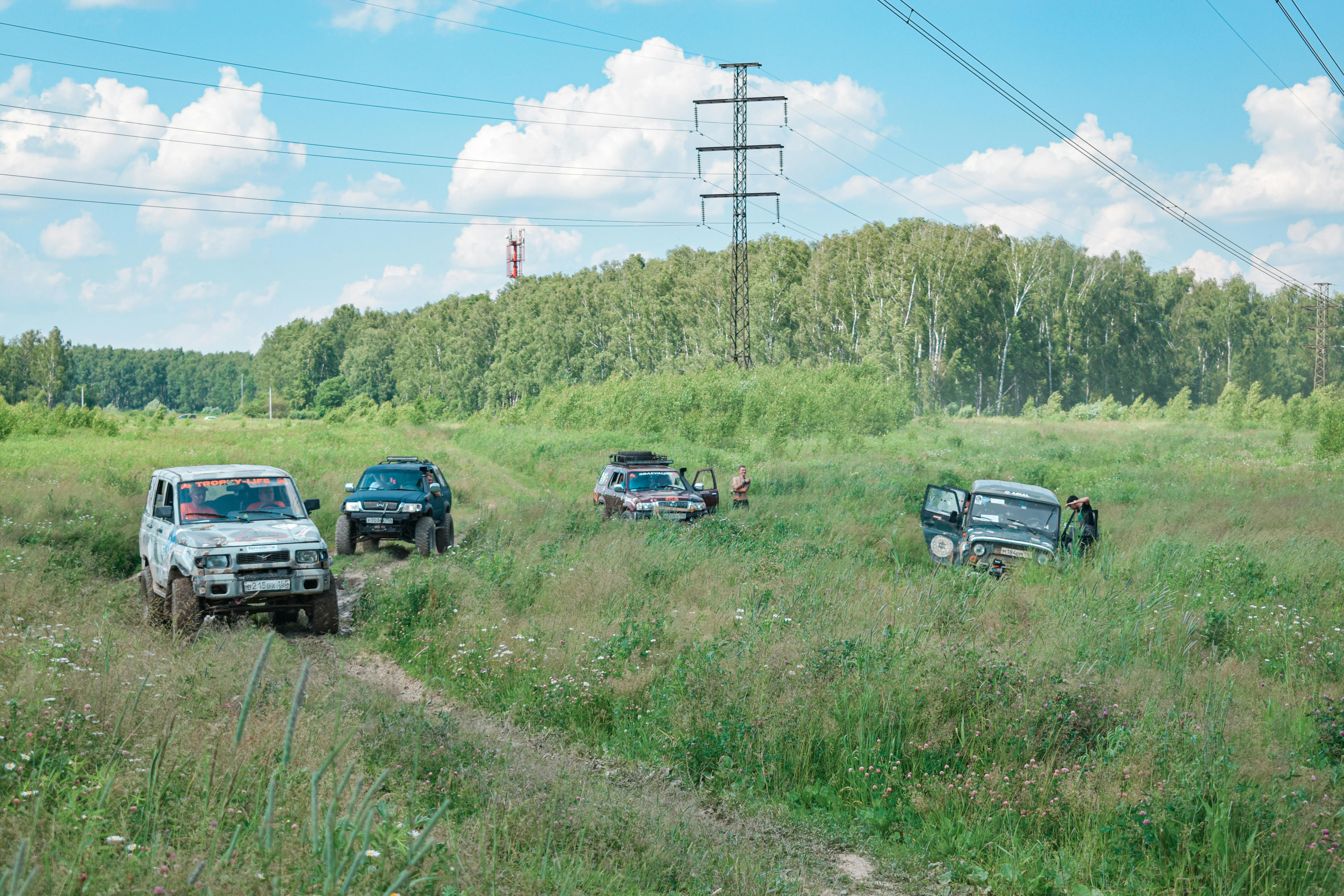 Vehicle Driving on Dirt Road · Free Stock Photo