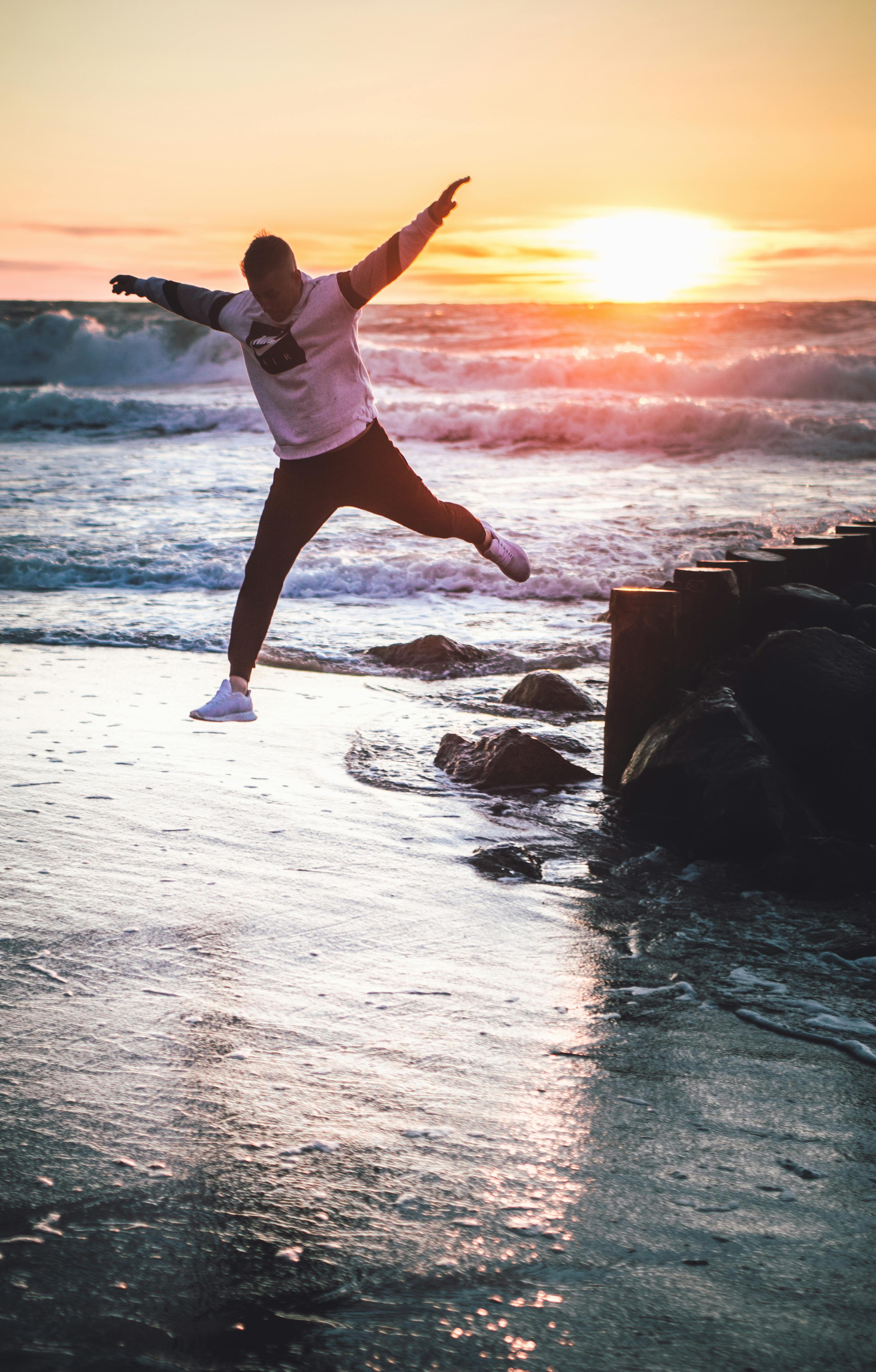 Silhouette Photography of Group of People Jumping during Golden Time ...