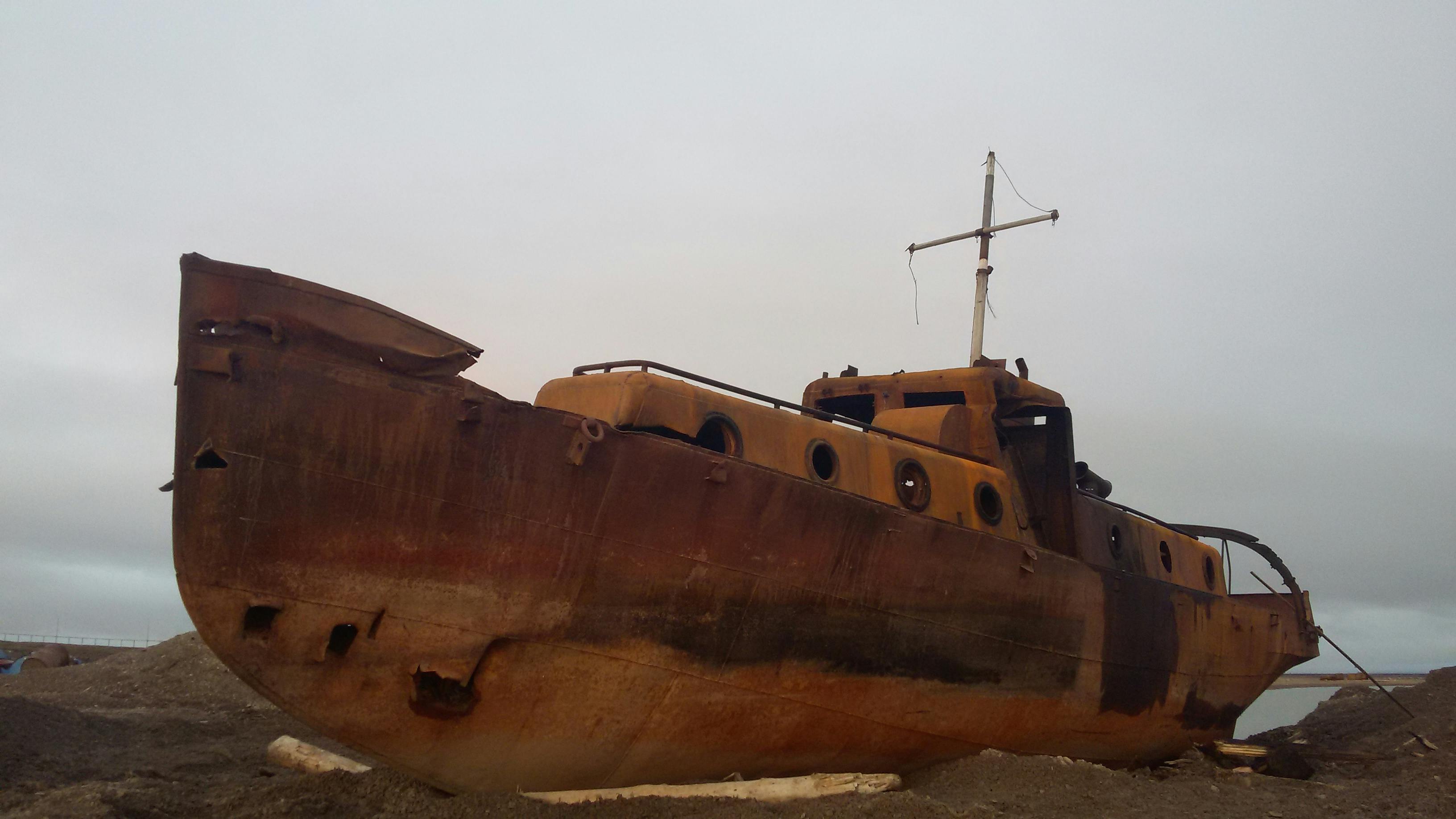 A n Abandoned Ship on Shore · Free Stock Photo