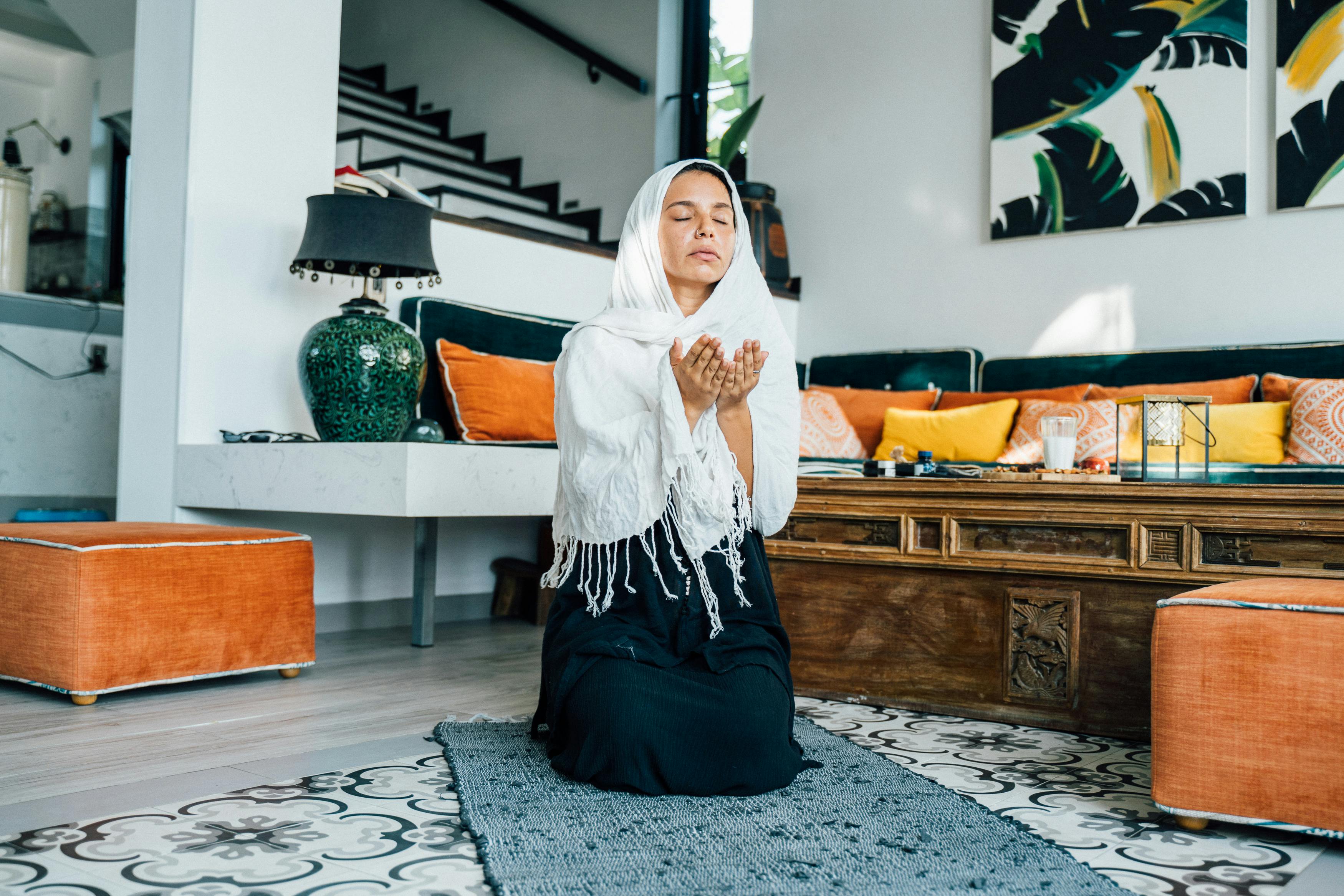 Woman Kneeling While Praying · Free Stock Photo
