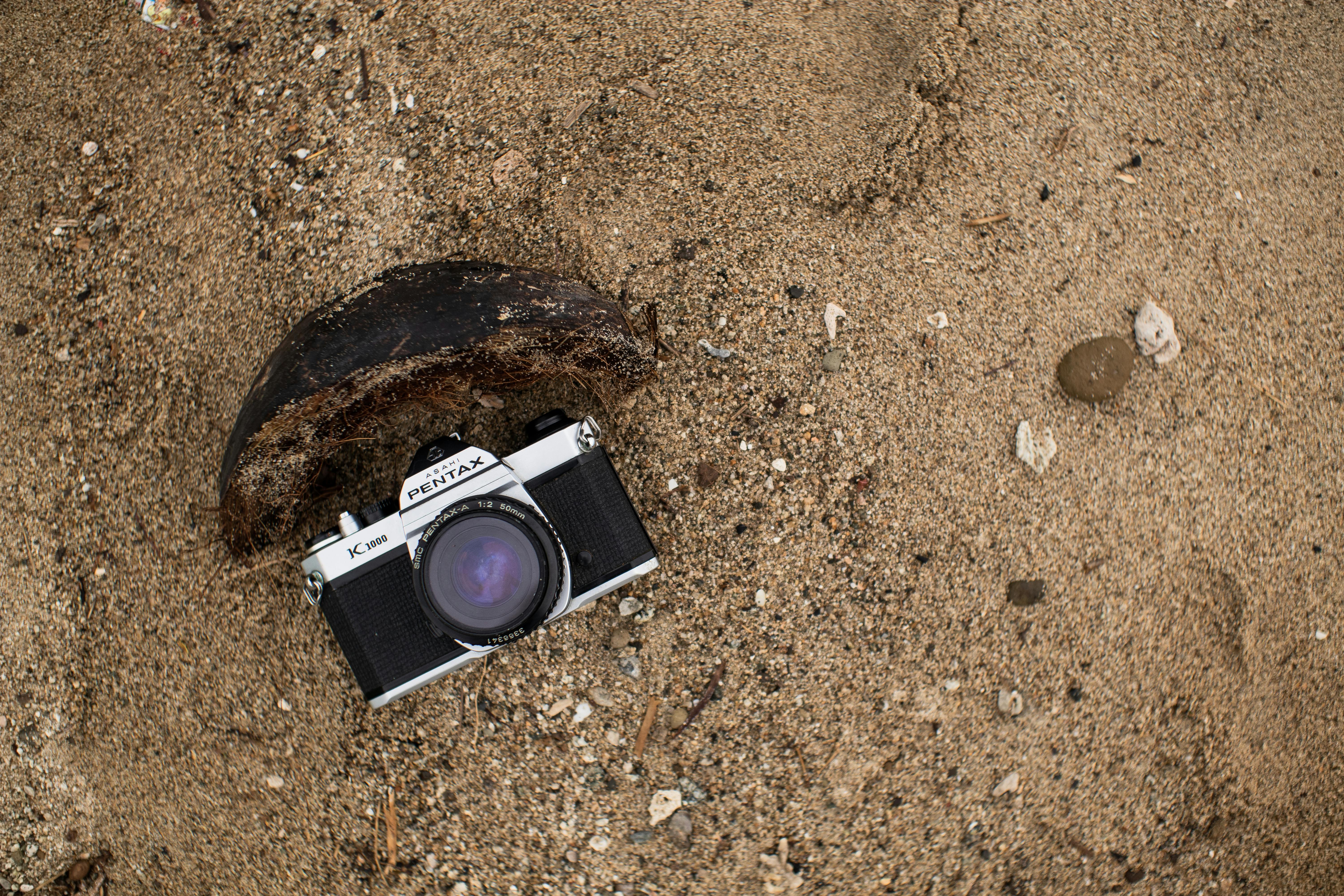 Camera on Sand · Free Stock Photo