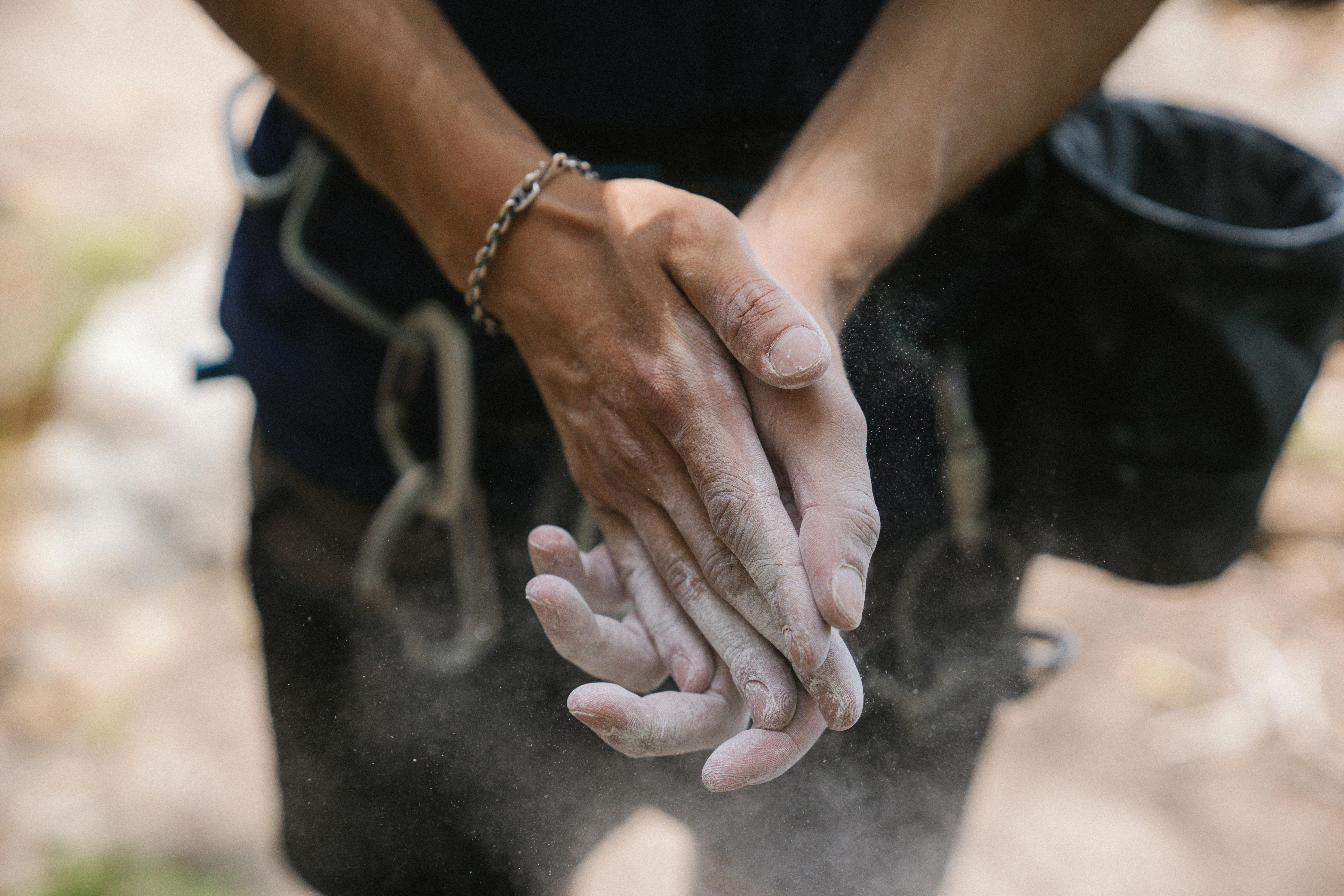 A Person with Powder in Hands · Free Stock Photo