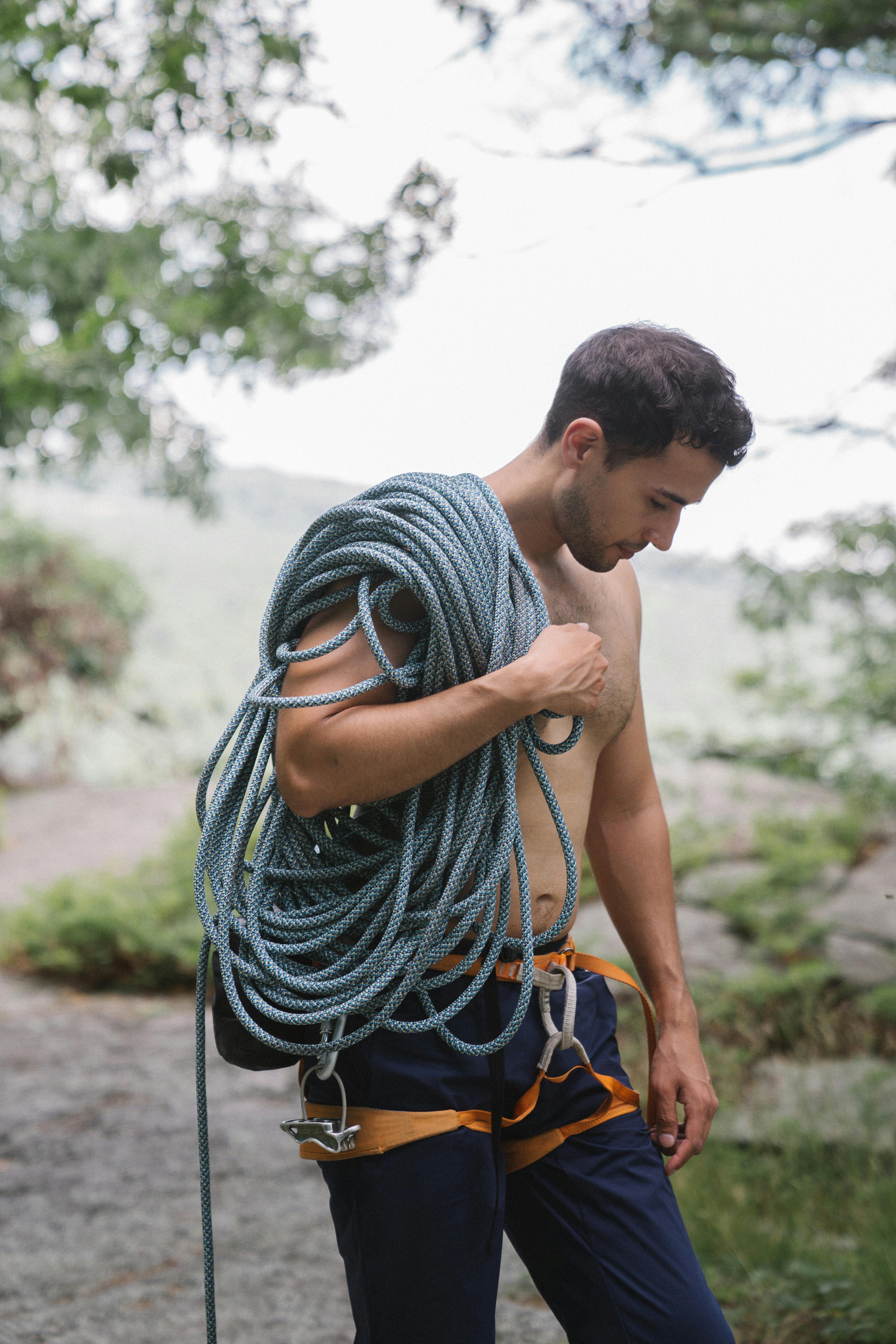 Man Carrying a Rope · Free Stock Photo