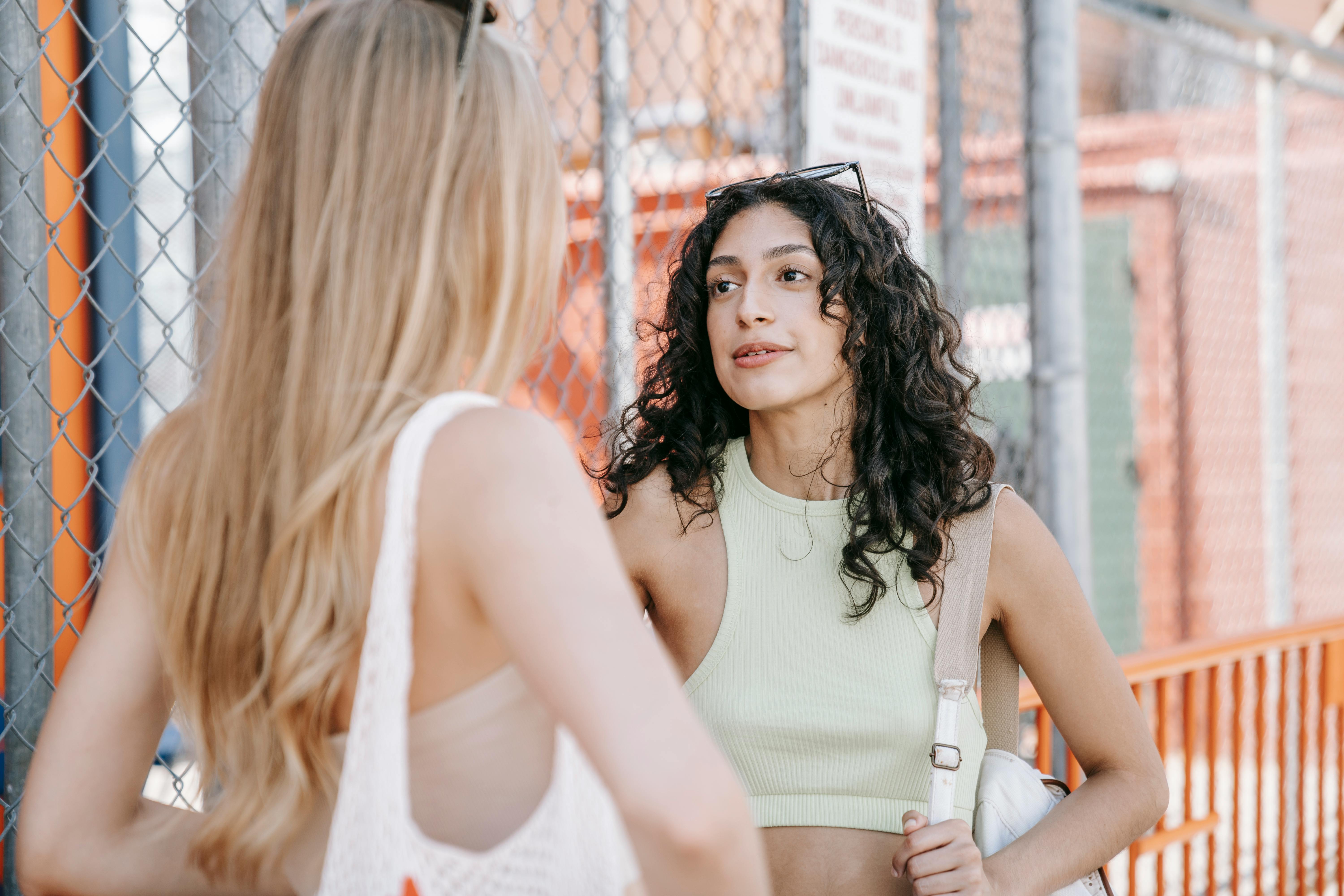 Girls Talking on Street · Free Stock Photo