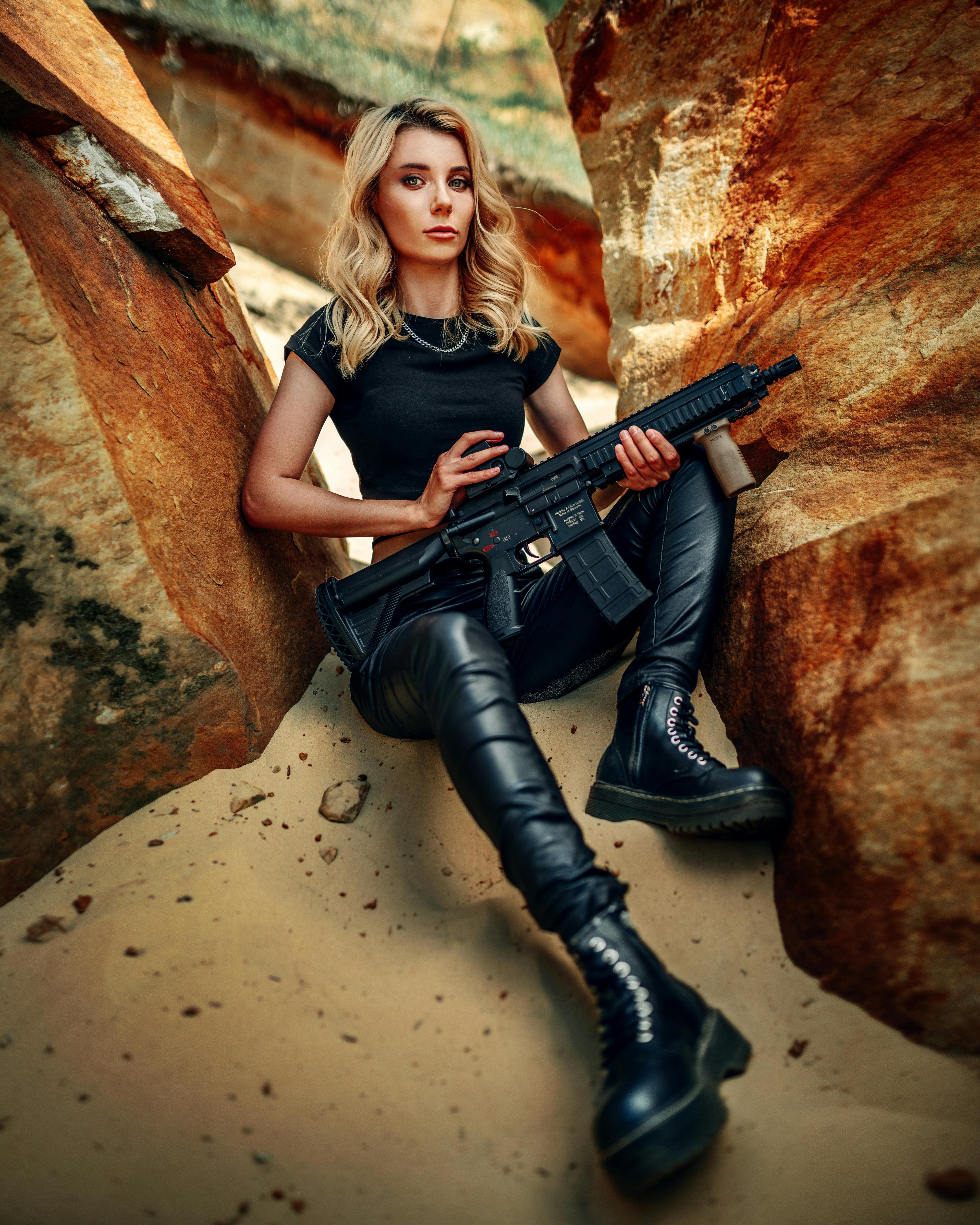 Woman Posing with Rifle · Free Stock Photo