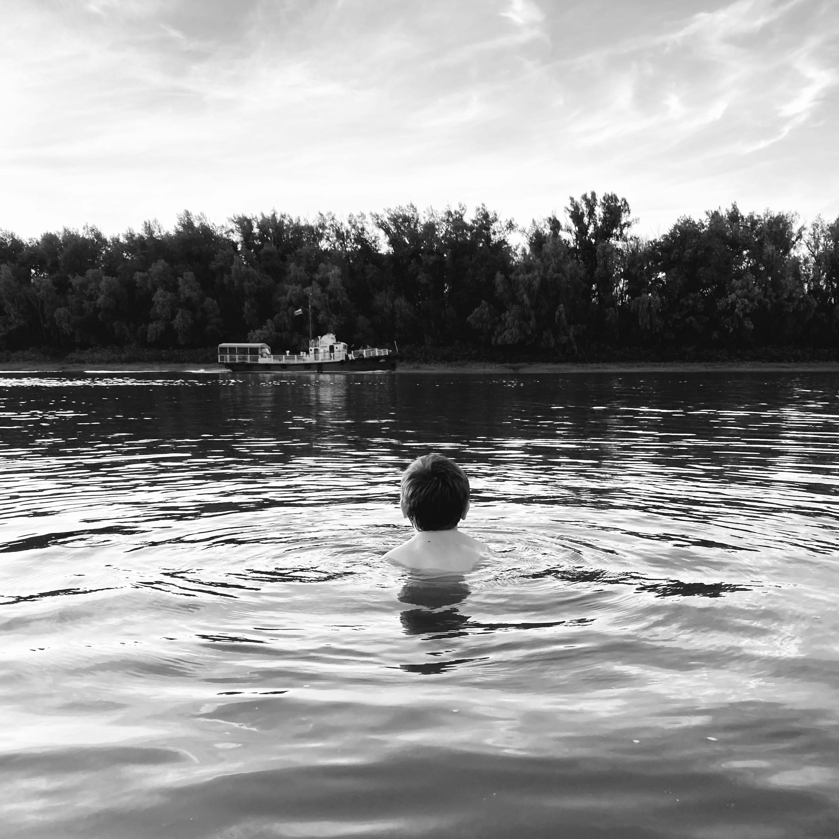 Boy in River · Free Stock Photo
