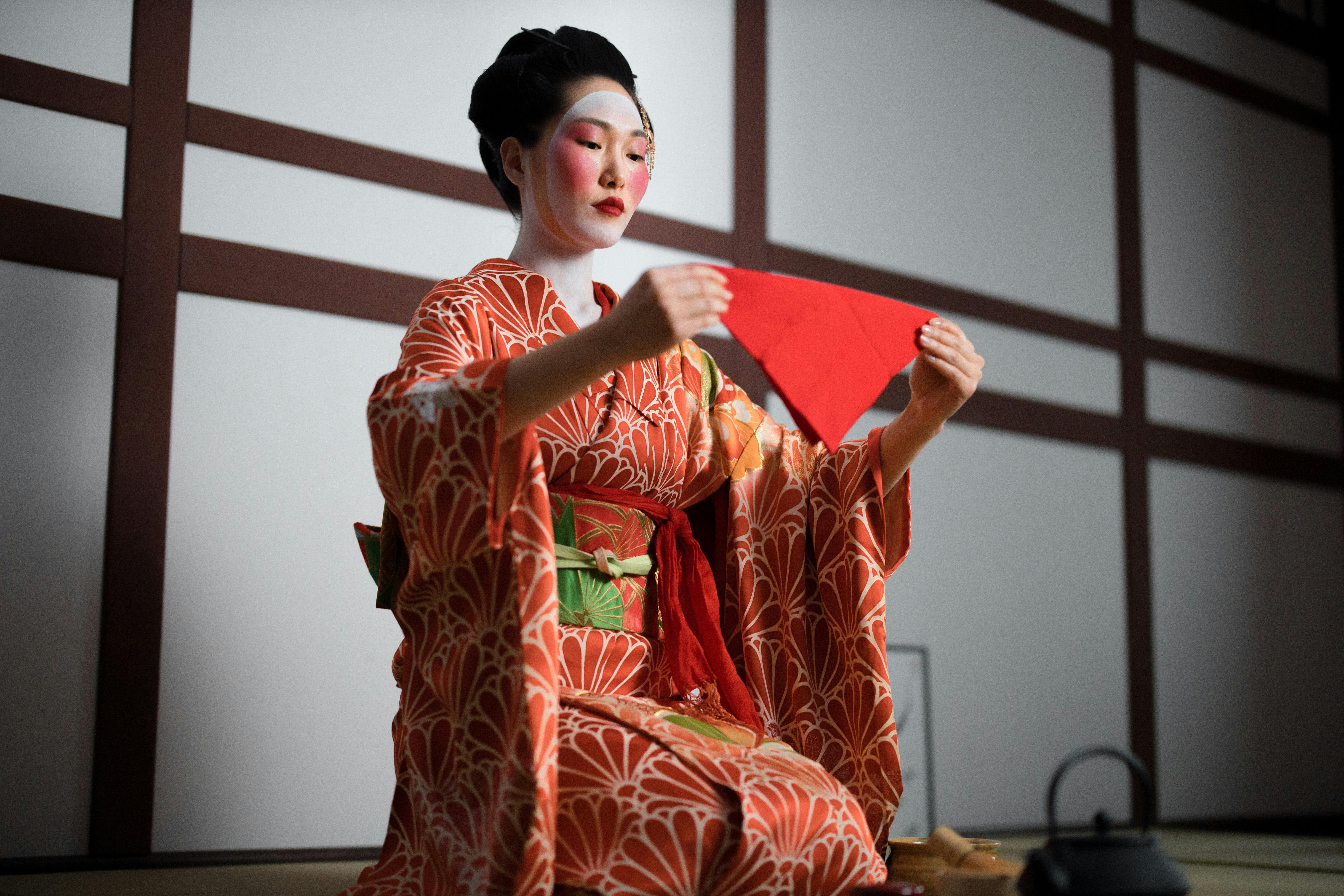 Woman Weraing Traditional Geisha Kimono at Tea Ceremony · Free Stock Photo