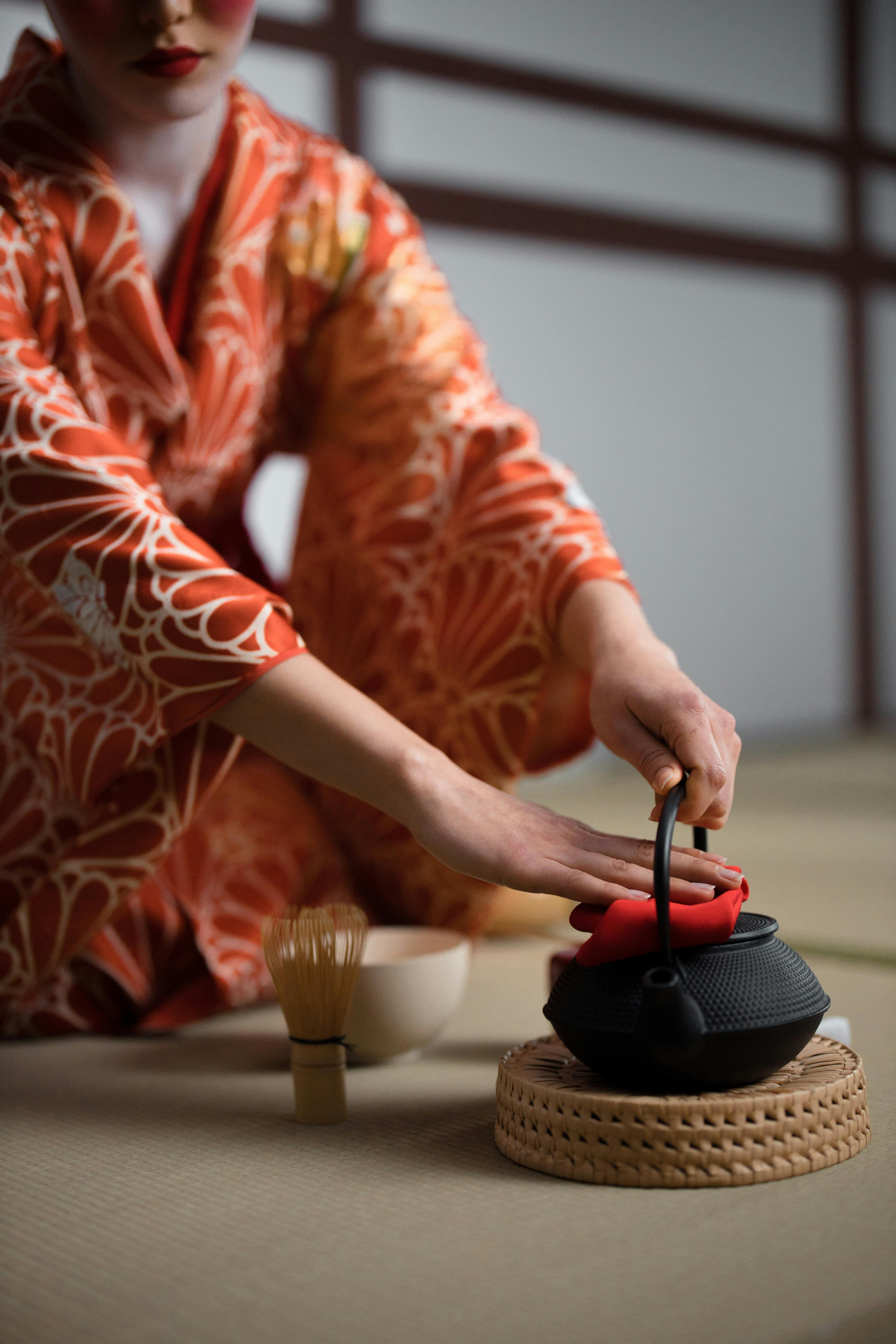 A Geisha Preparing a Tea · Free Stock Photo