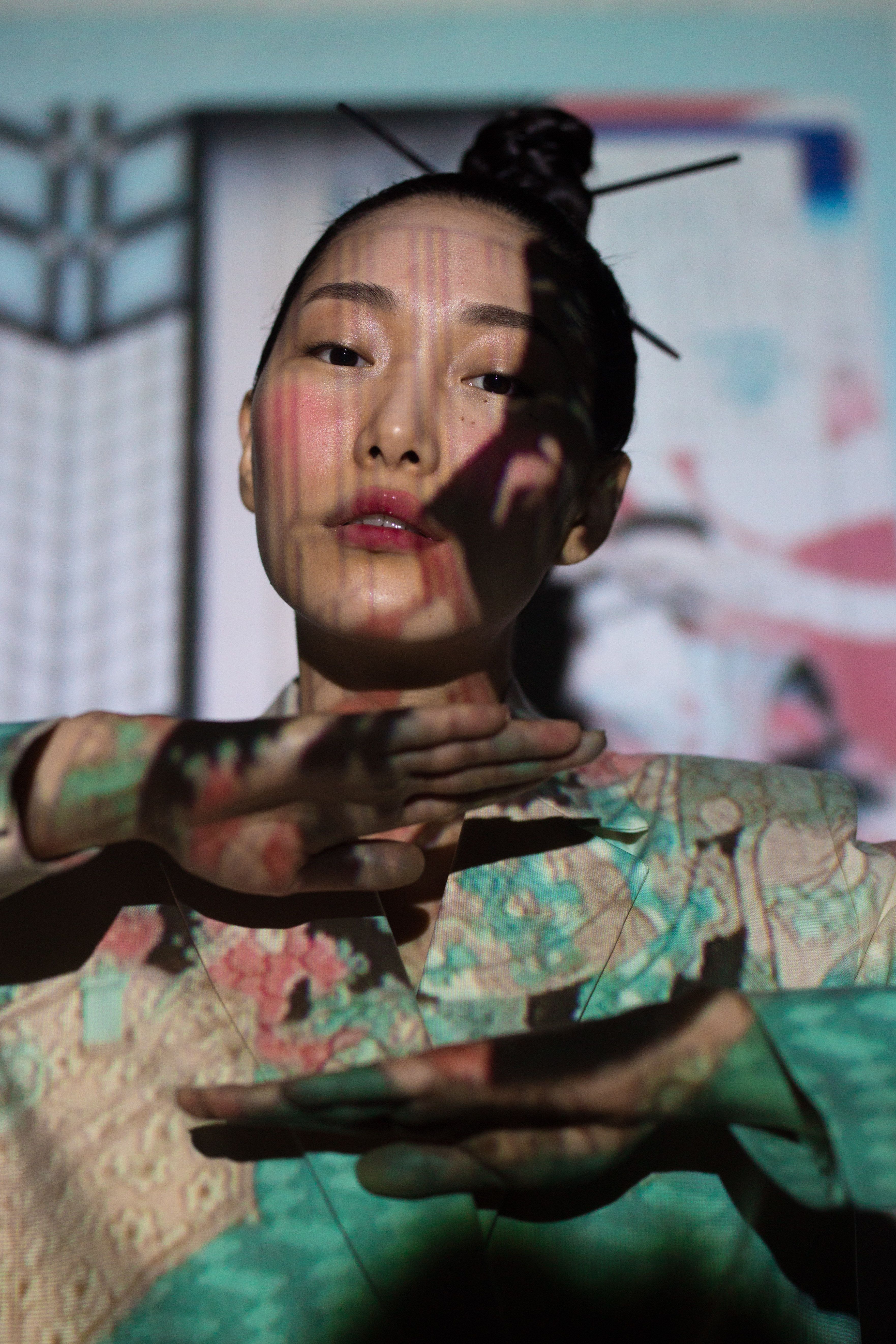 Portrait of a Young Woman with an Image Projected on her · Free Stock Photo