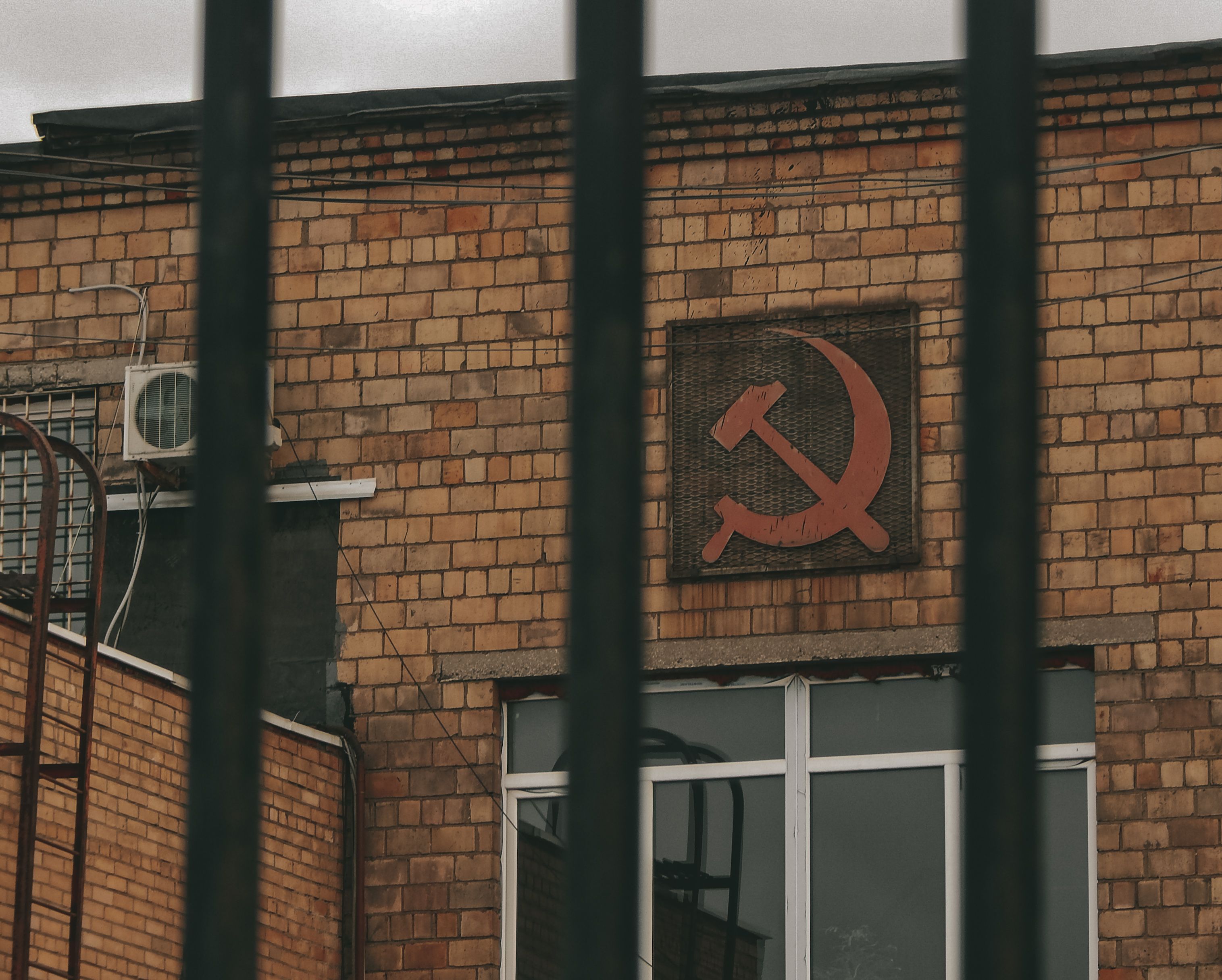Hand Holding Bar in Window · Free Stock Photo
