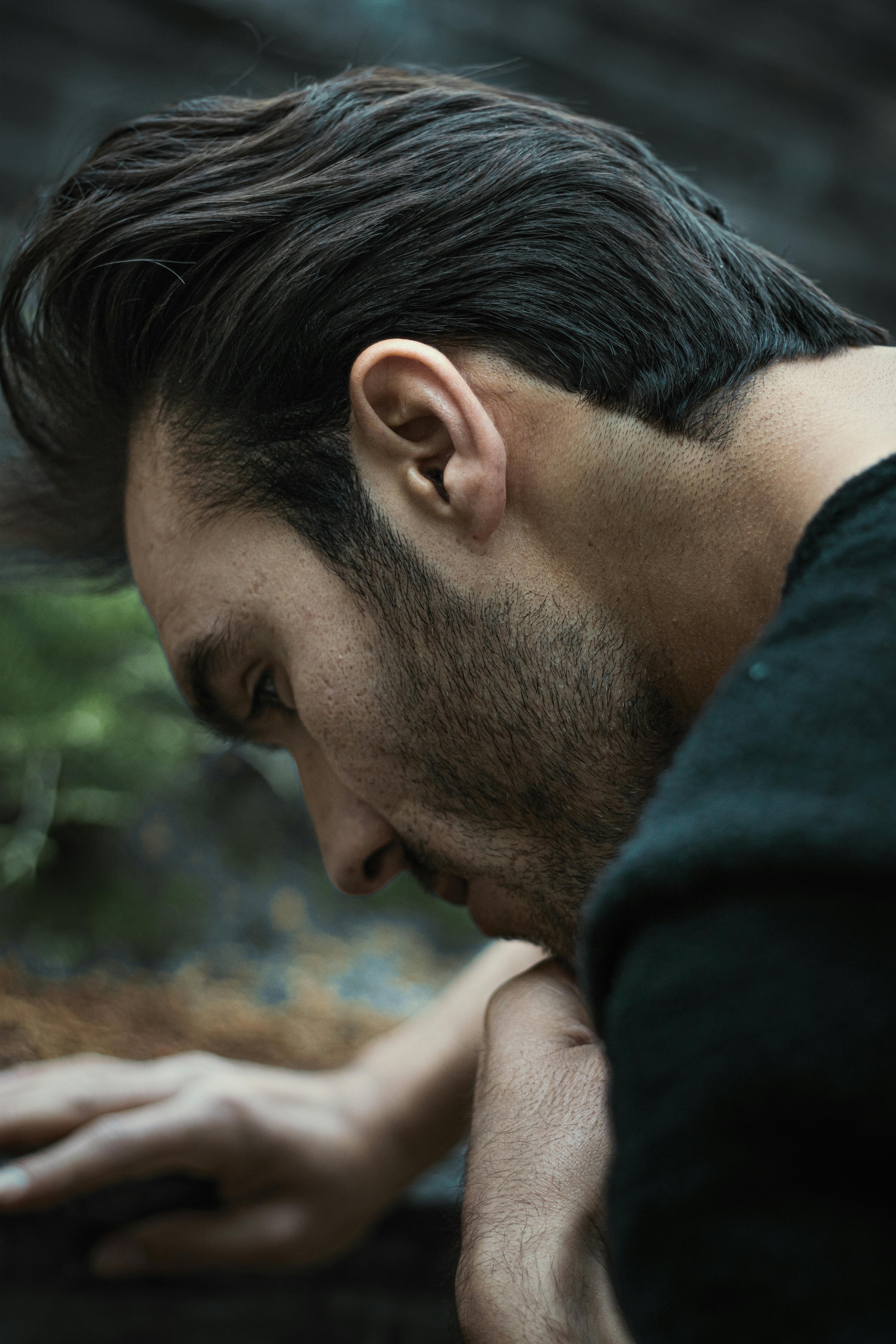 Side View Photo of Man Looking Focused · Free Stock Photo