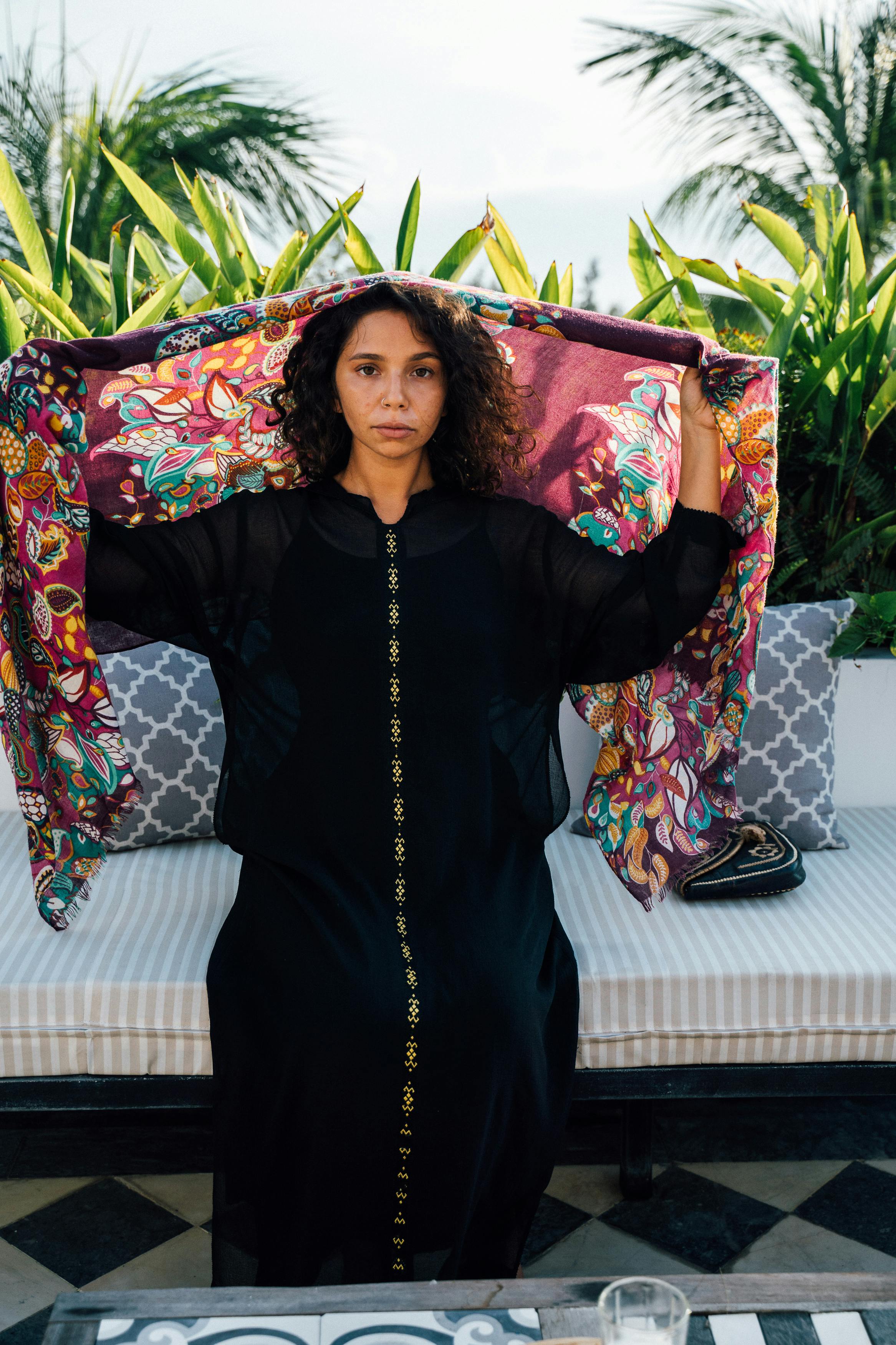 Woman Wearing Ornate Algerian Outfit Sitting on Stairs · Free Stock Photo
