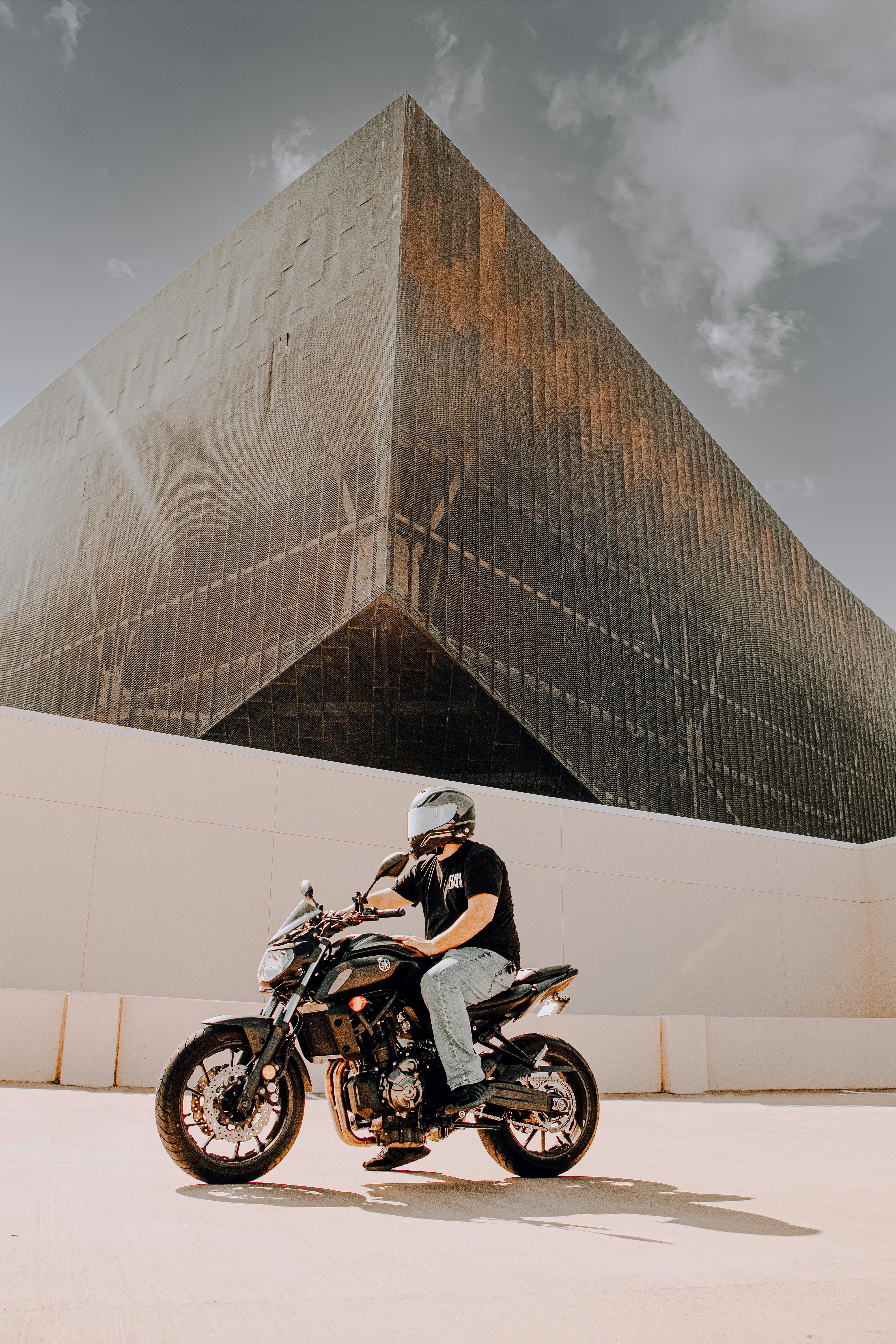 Woman Riding Red Motor Scooter · Free Stock Photo