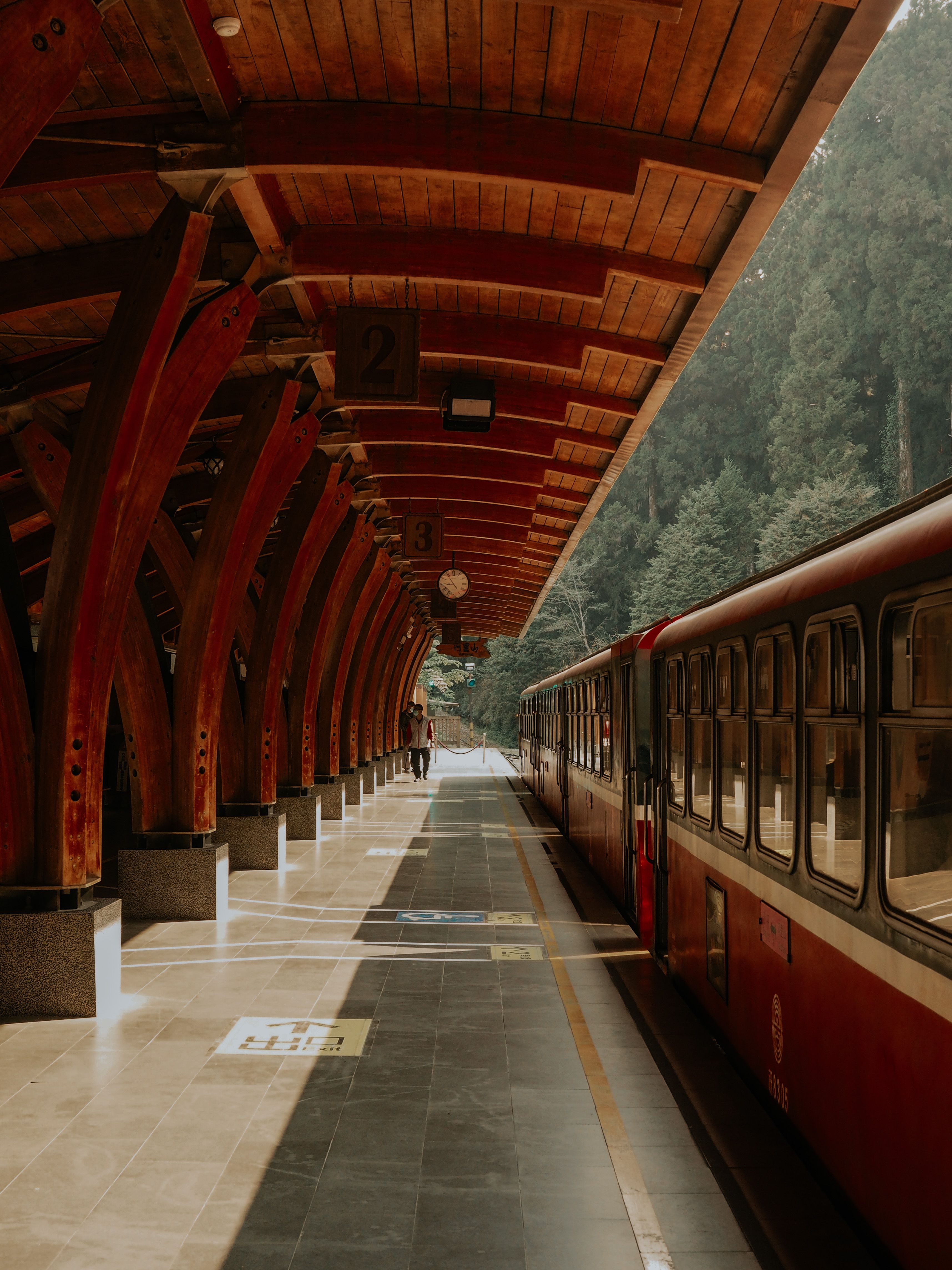 Red and White Train in a Platform · Free Stock Photo