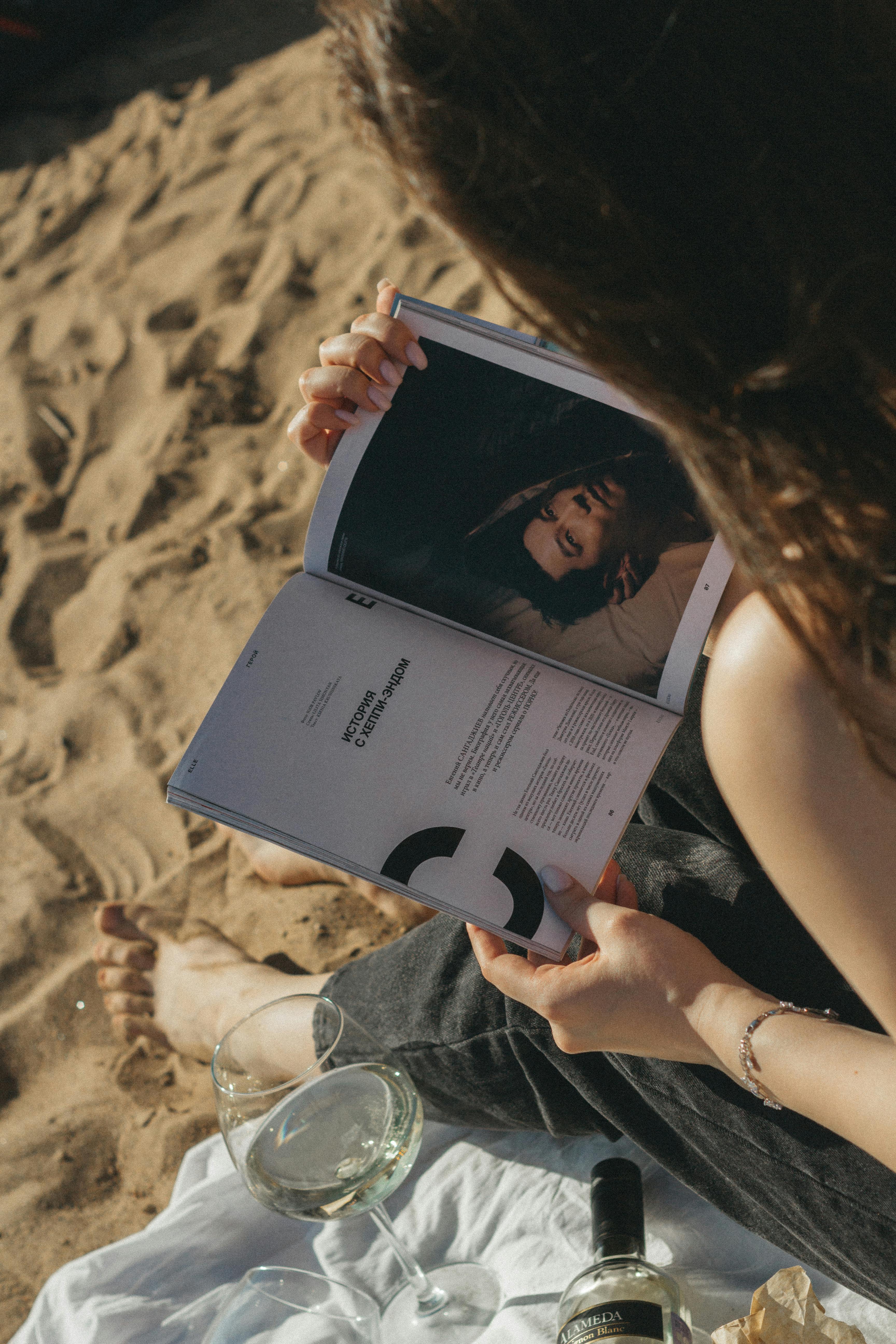A Person Reading a Magazine · Free Stock Photo