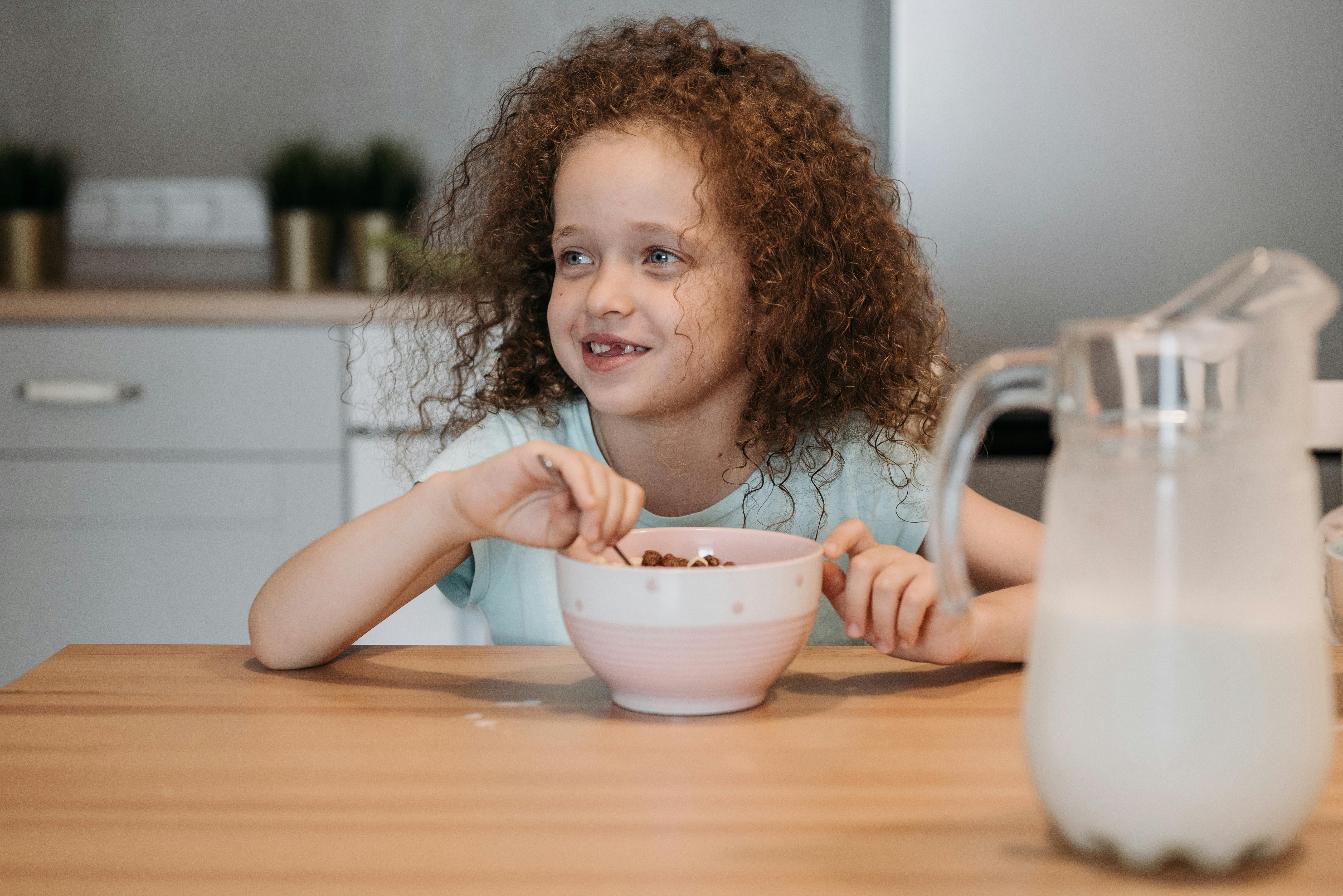 Young Girl Having a Breakfast · Free Stock Photo