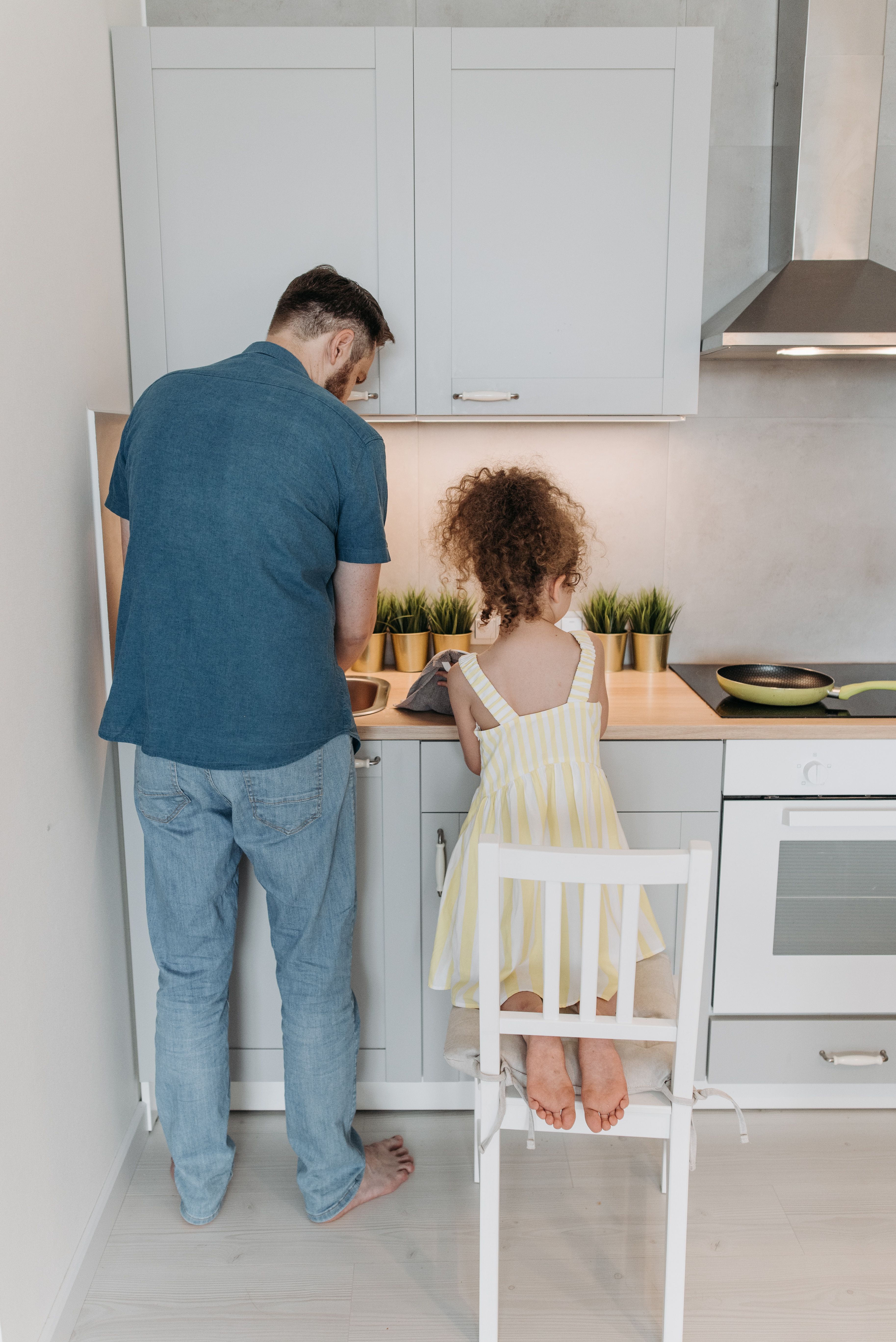 Mother and Child Preparing Crepes · Free Stock Photo