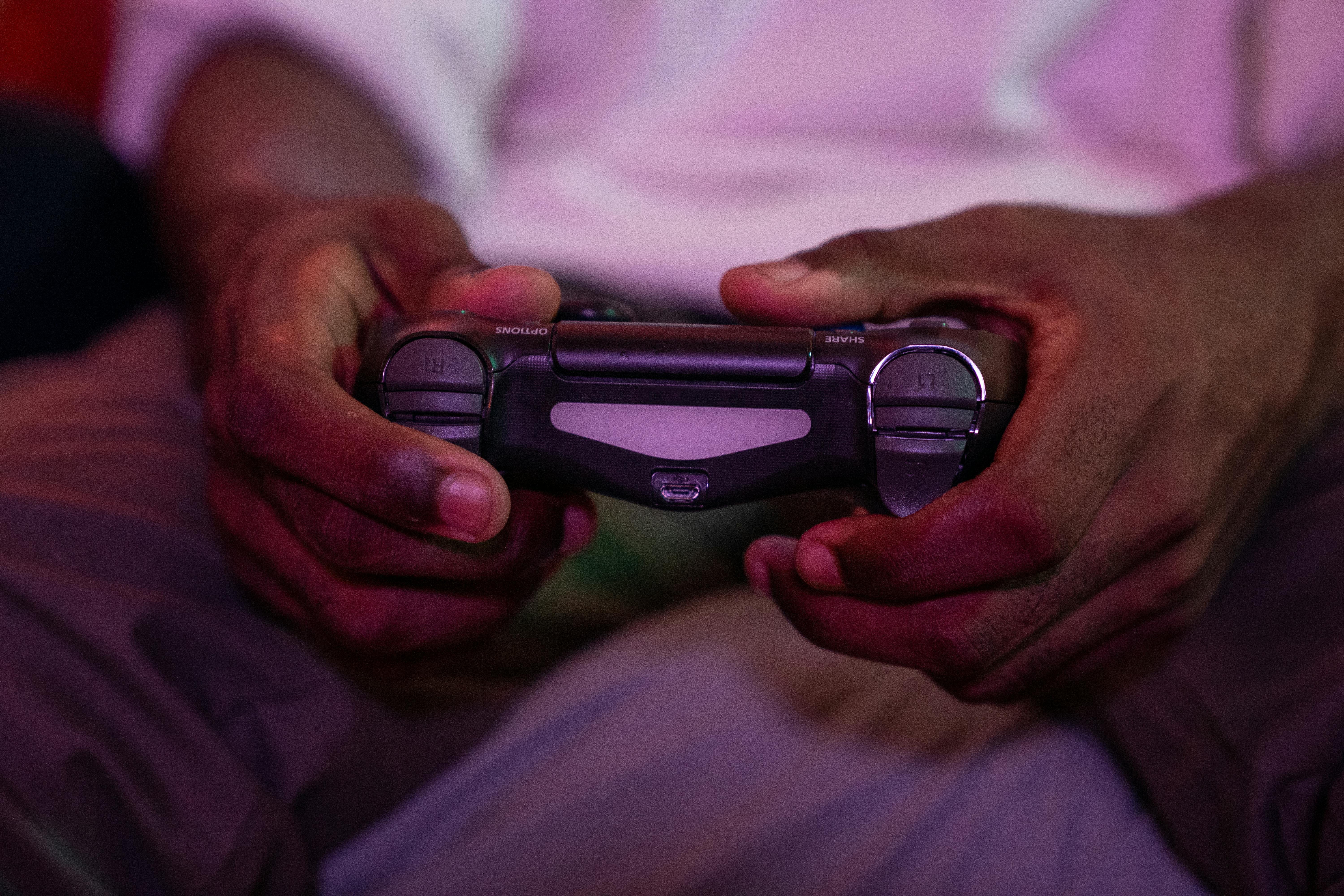Man Holding Controller · Free Stock Photo